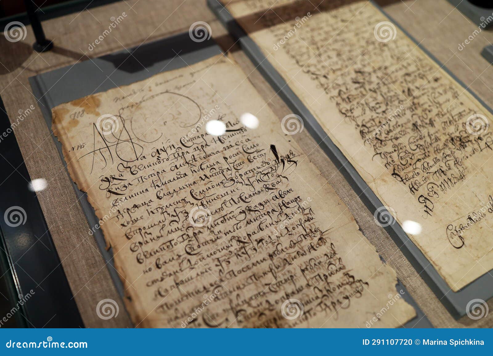 An Old Book in a Museum Under Glass Stock Photo - Image of bottle ...