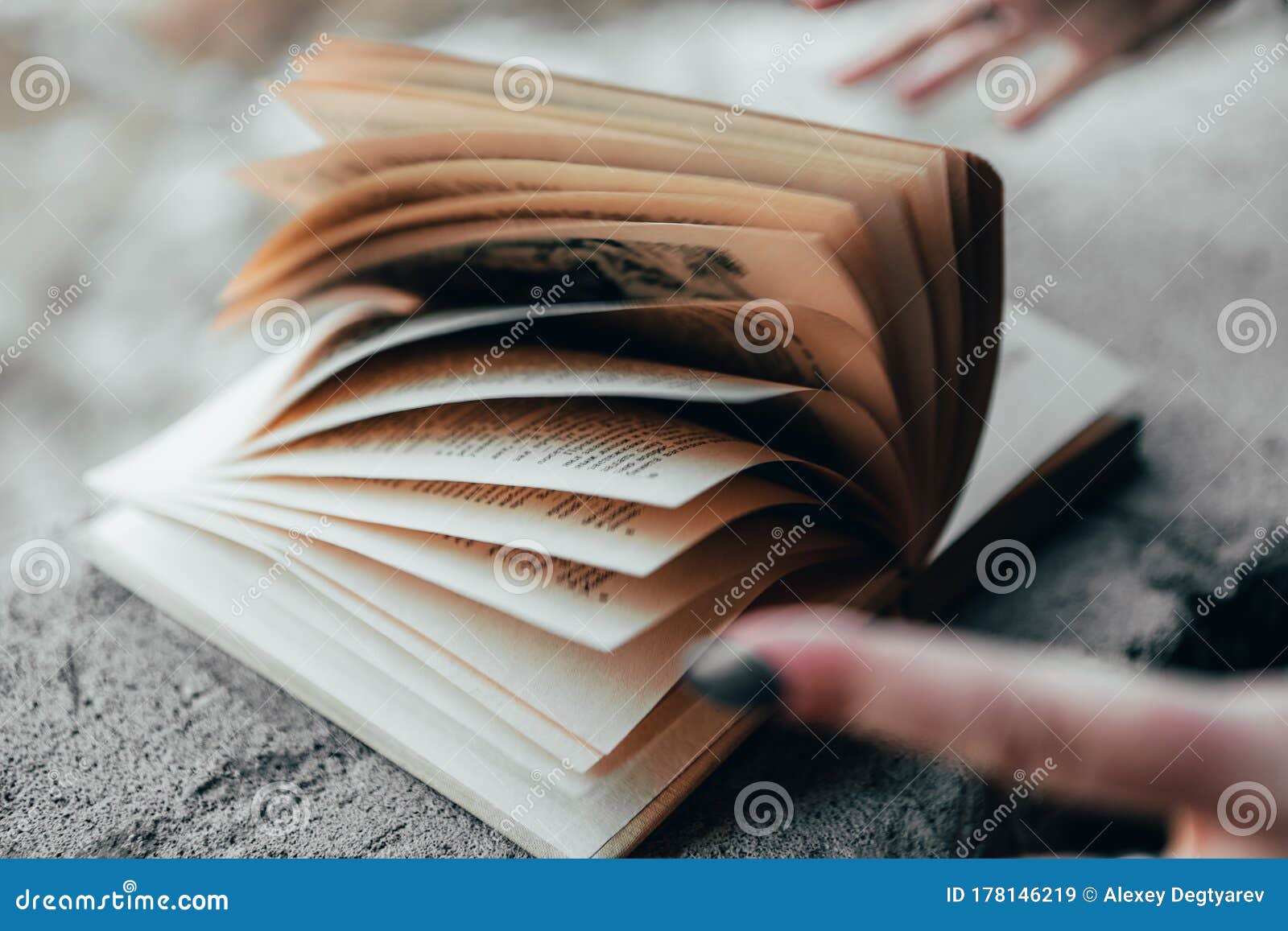 A Book Open on a Concrete Surface Stock Image - Image of educated ...