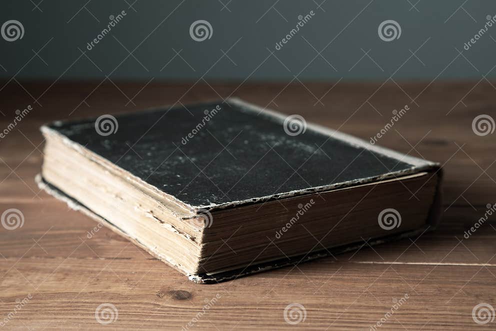 Old book on the table stock image. Image of antique - 215530237