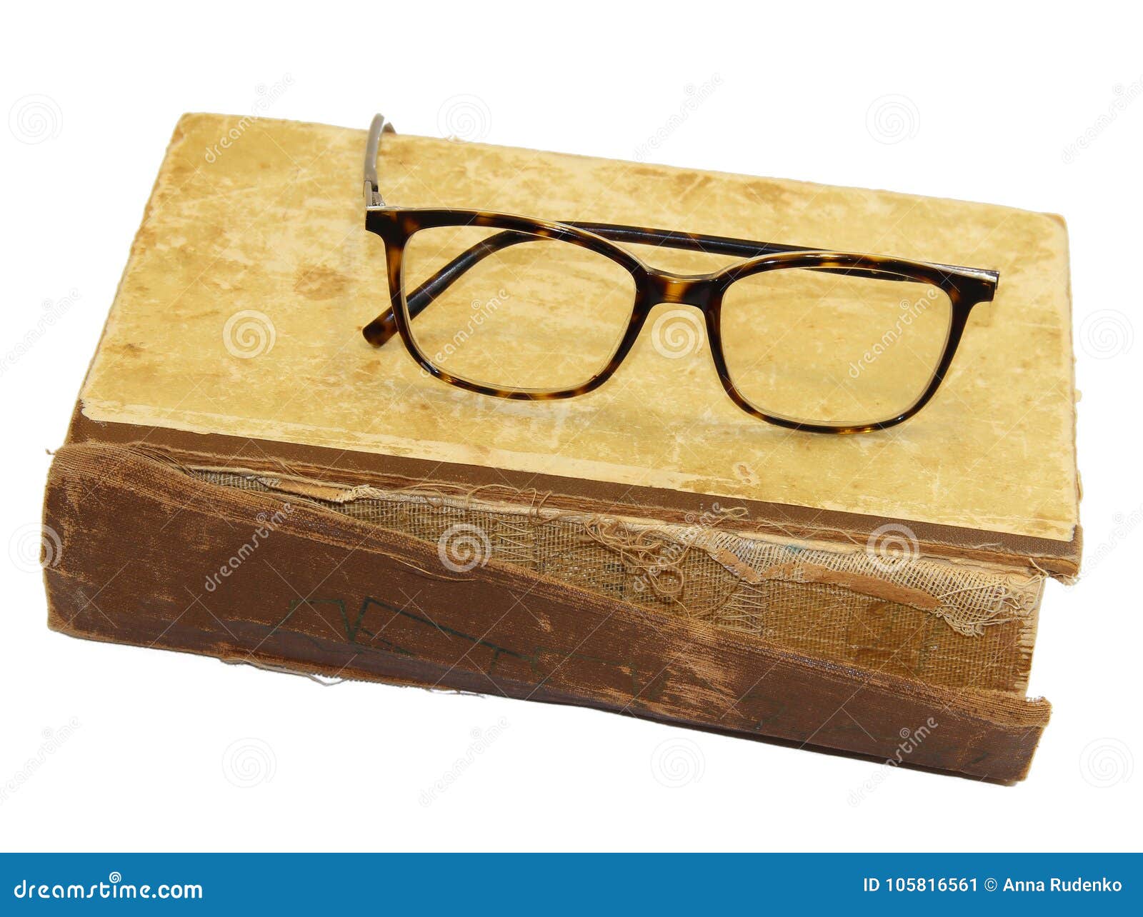 On an Old Book with a Torn Binding and a Broken Spine are Glasses Stock ...