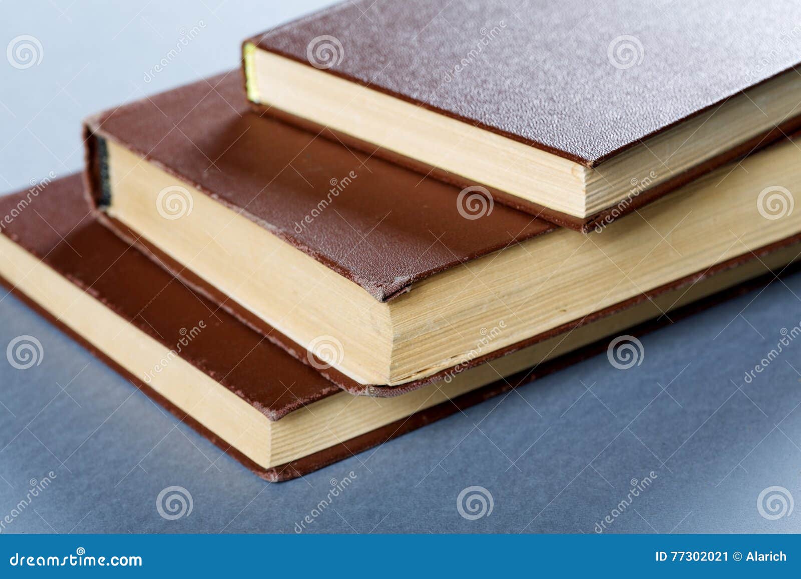 Old books in brown cover stock image. Image of books - 77302021