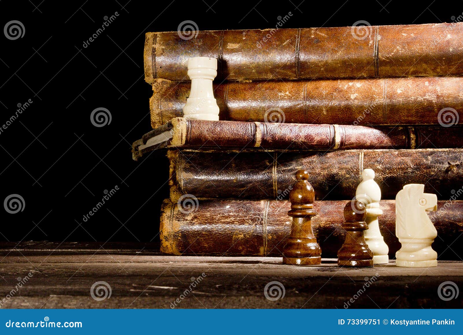 Old books and chess pieces stock image. Image of bookcase - 73399751