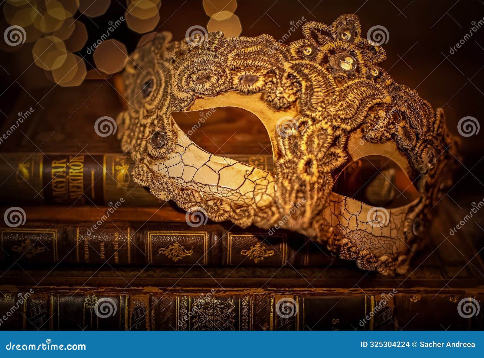 Old books with a mask stock photo. Image of costume - 325304224