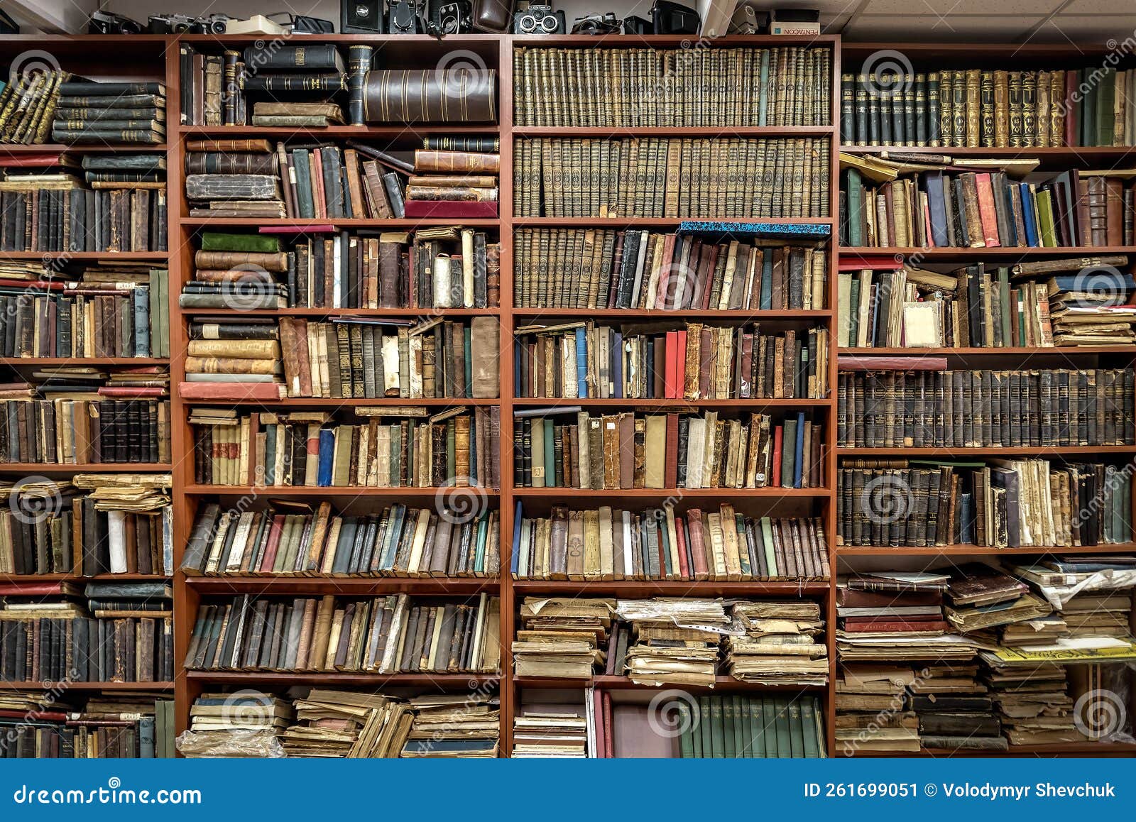 Old books on the shelves editorial photo. Image of university - 261699051