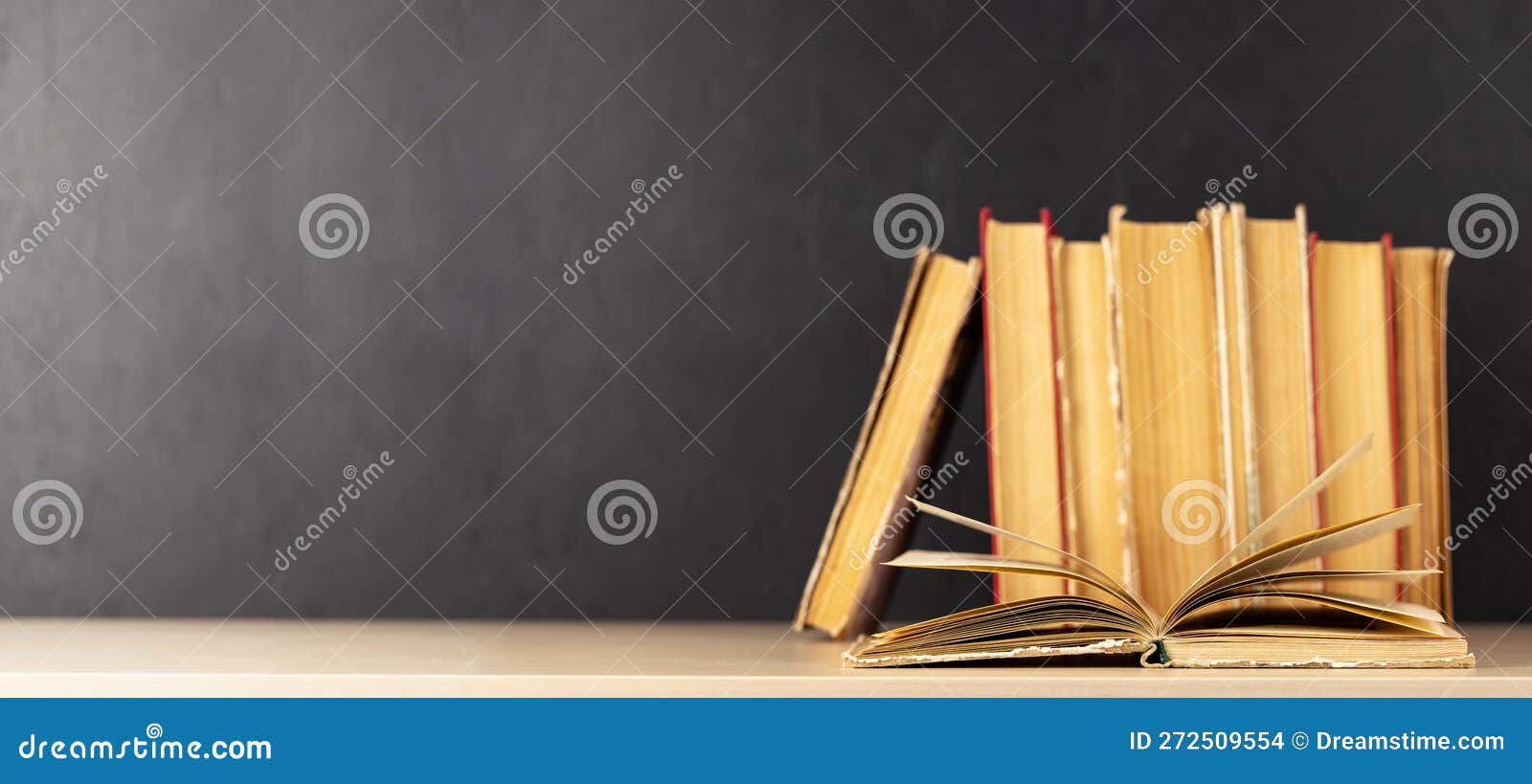Old Books on a Table, with One Book Open Stock Photo - Image of spine ...