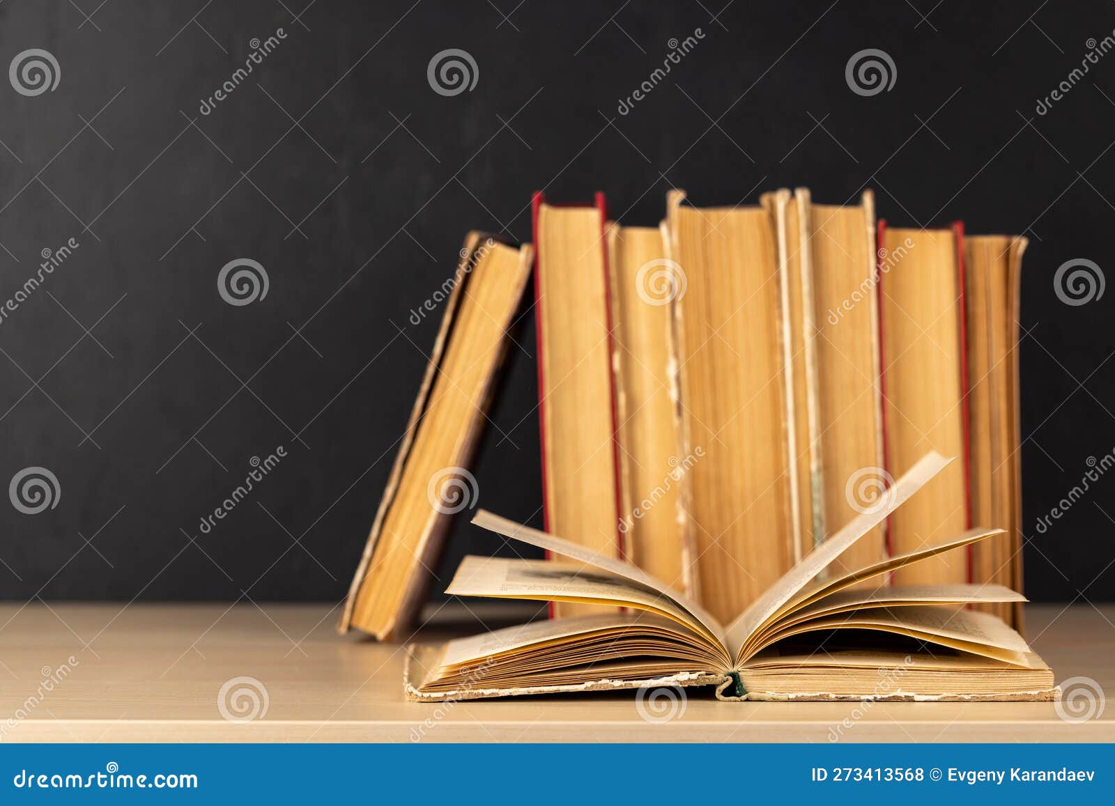 Old Books on a Table, with One Book Open Stock Photo - Image of ...