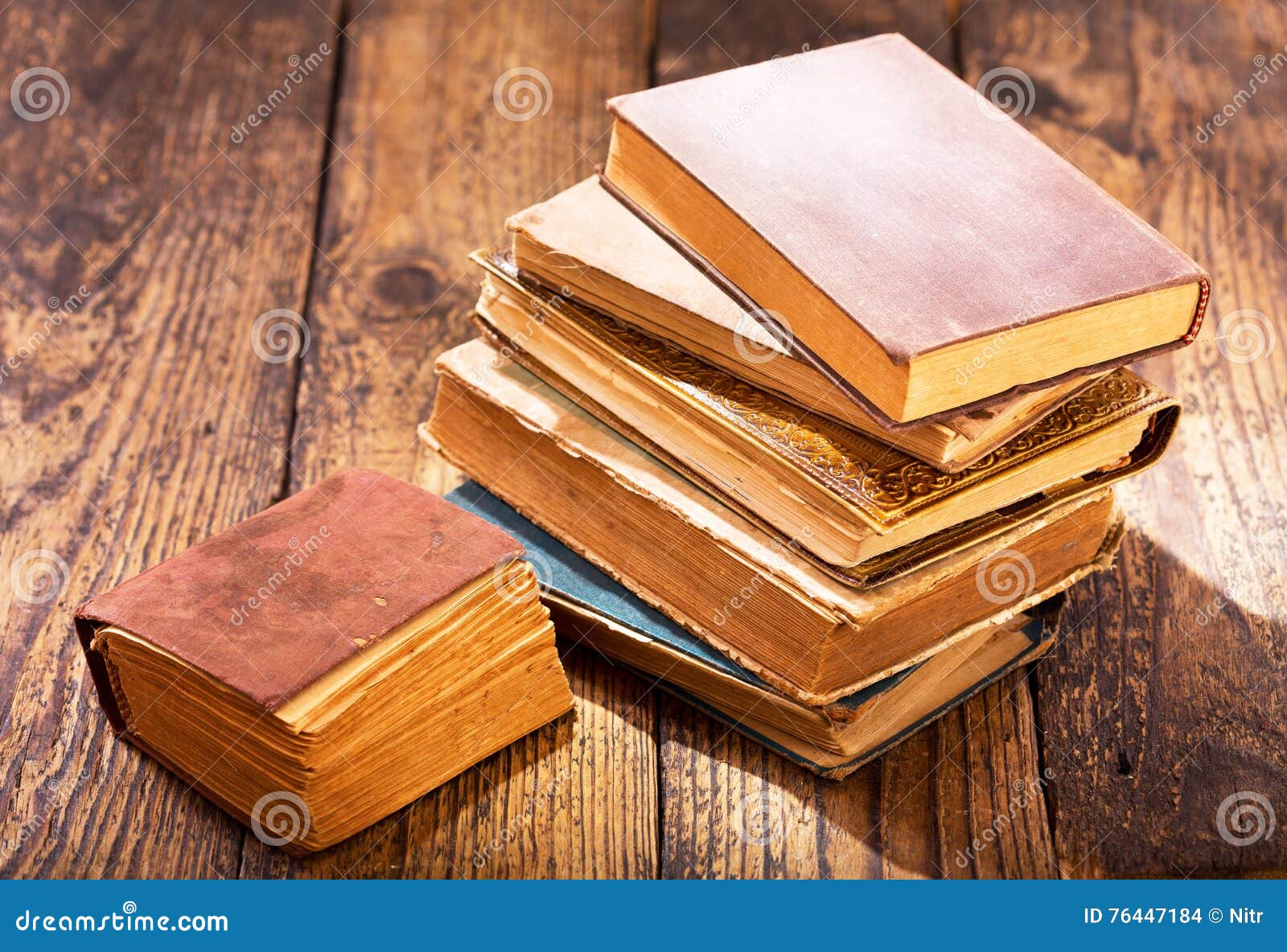 Old books on a table stock photo. Image of vintage, book - 76447184