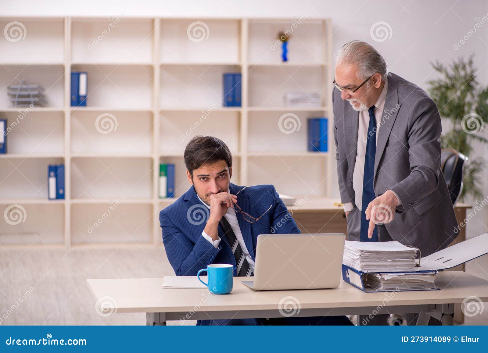Old Male Boss and Young Male Employee in the Office Stock Image - Image ...
