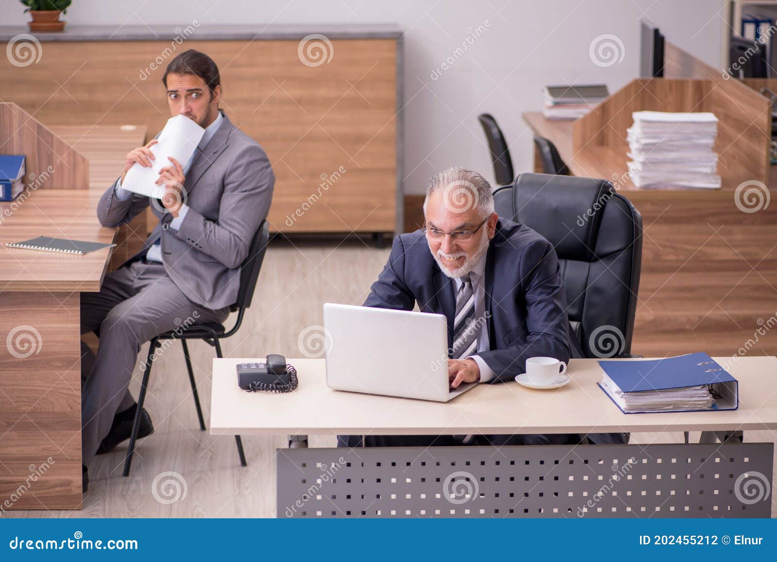 Old Boss and Young Male Assistant in the Office Stock Photo - Image of ...