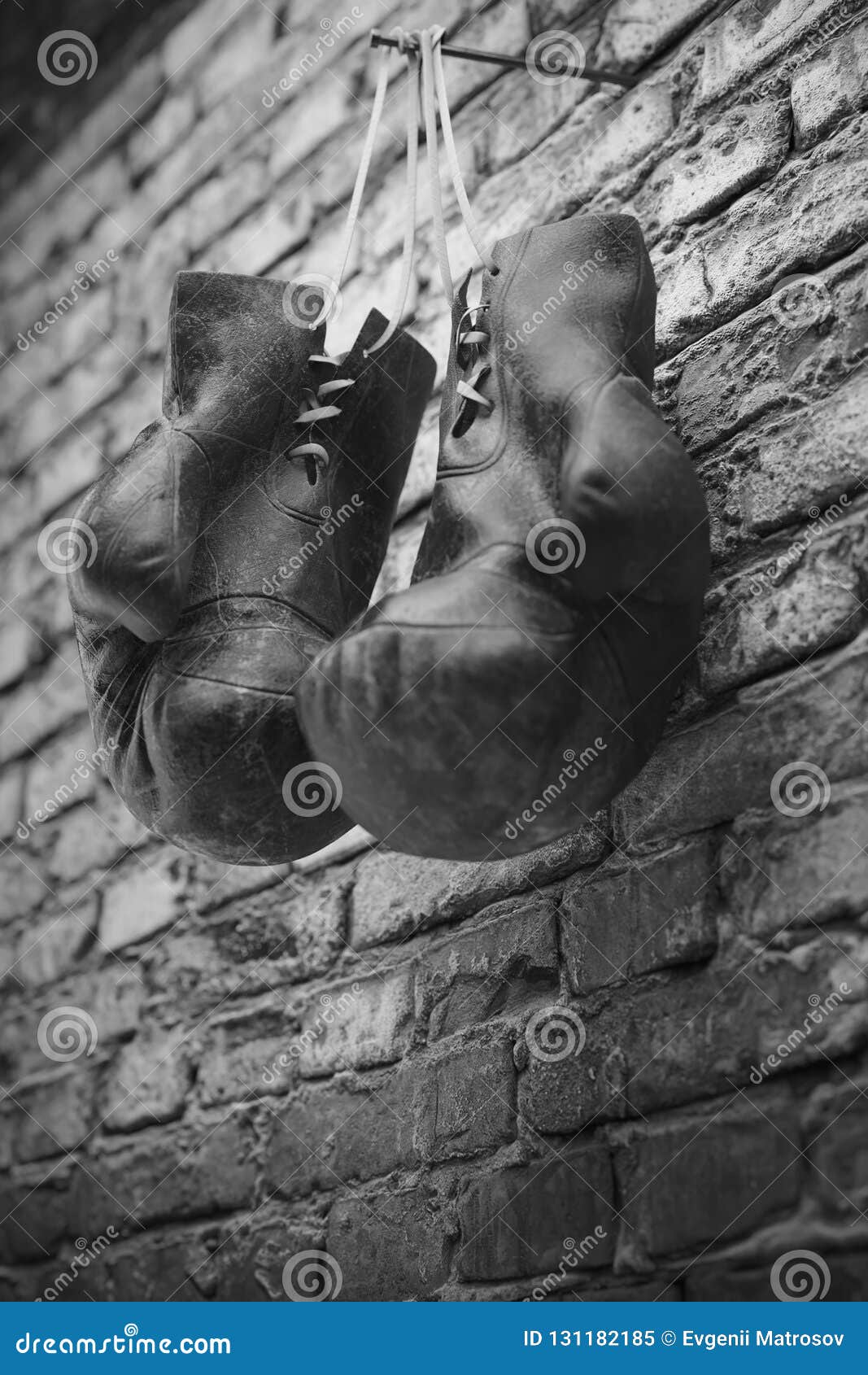Old Boxing Gloves Hang on Nail on Brick Wall with Copy Space for Text ...