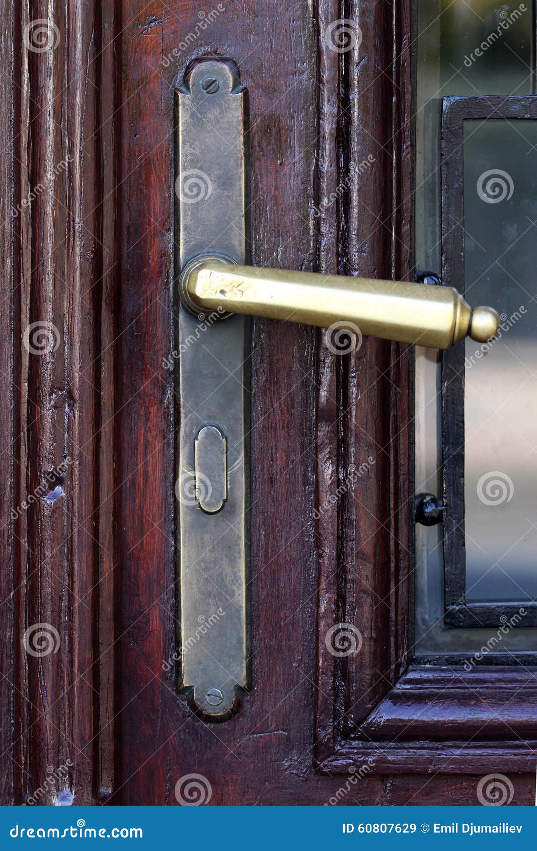 Old Brass Handle of a Wooden Door Stock Image - Image of closeup ...