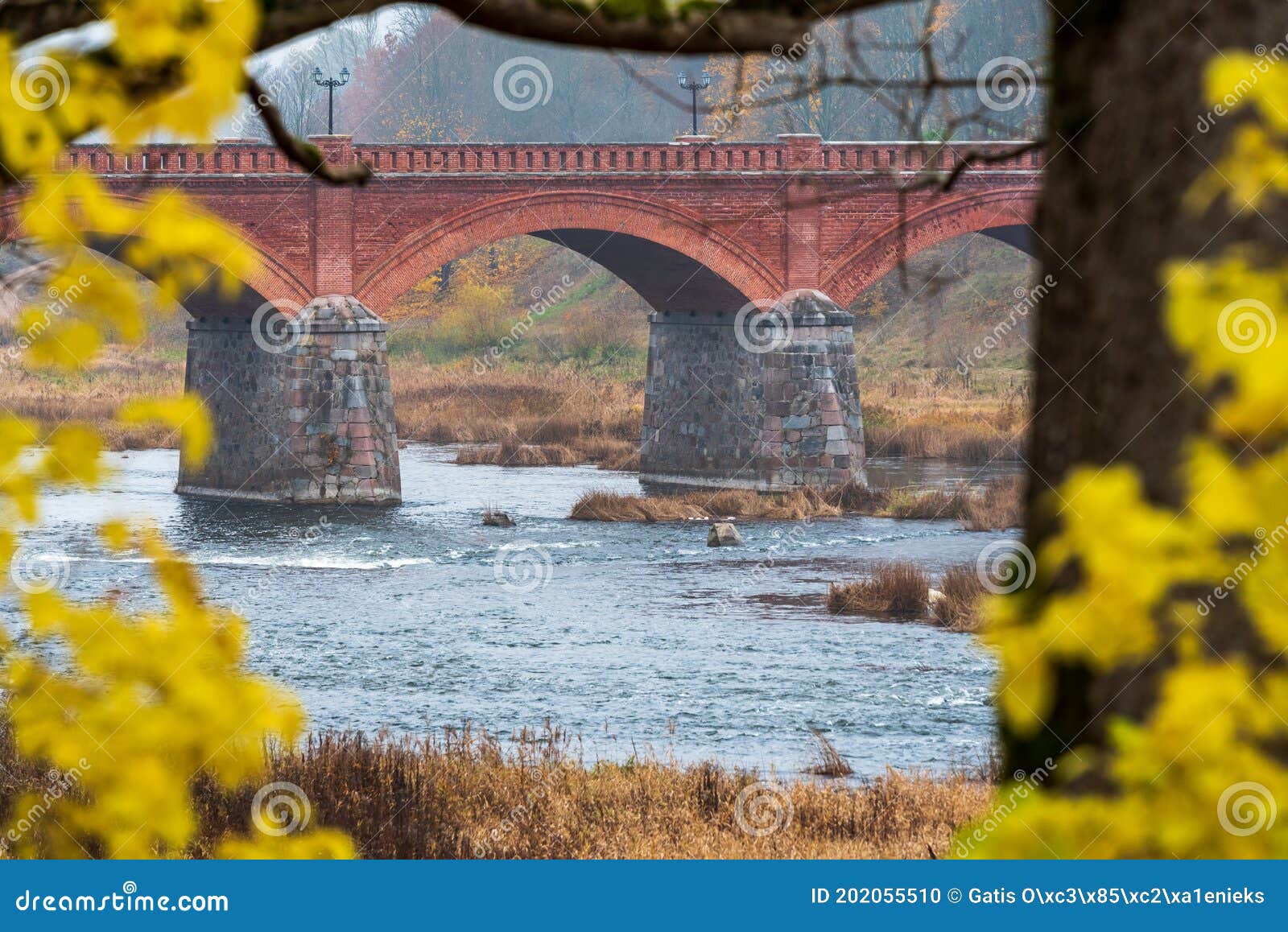 Old brick bridge in autumn stock photo. Image of travel - 202055510