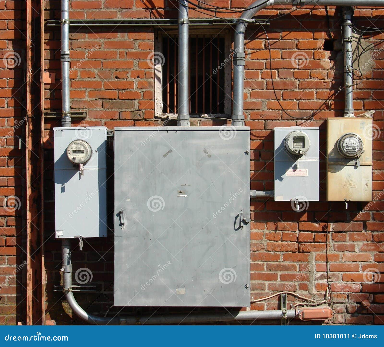 Old Brick Building and Electrical Meters Stock Image - Image of ...