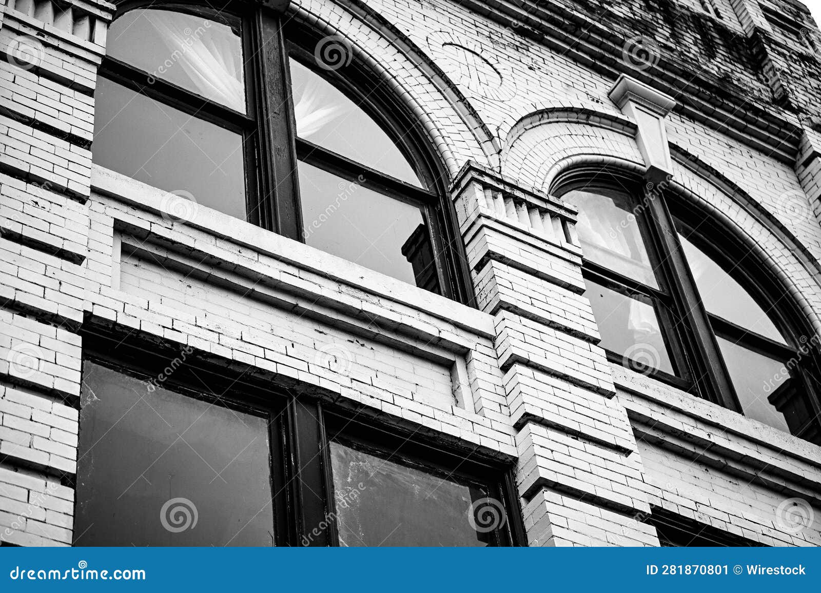 Old Brick Building Exterior in Grayscale Stock Image - Image of ...