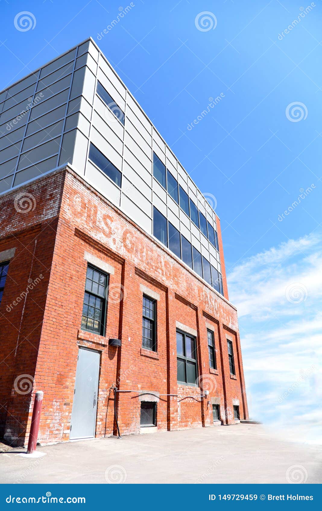 Brick Building with Modern Addition Stock Image - Image of grunge ...
