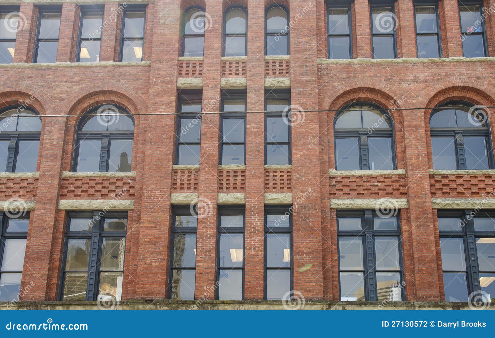 Old Brick Building with Paladium Windows Stock Photo - Image of arches ...