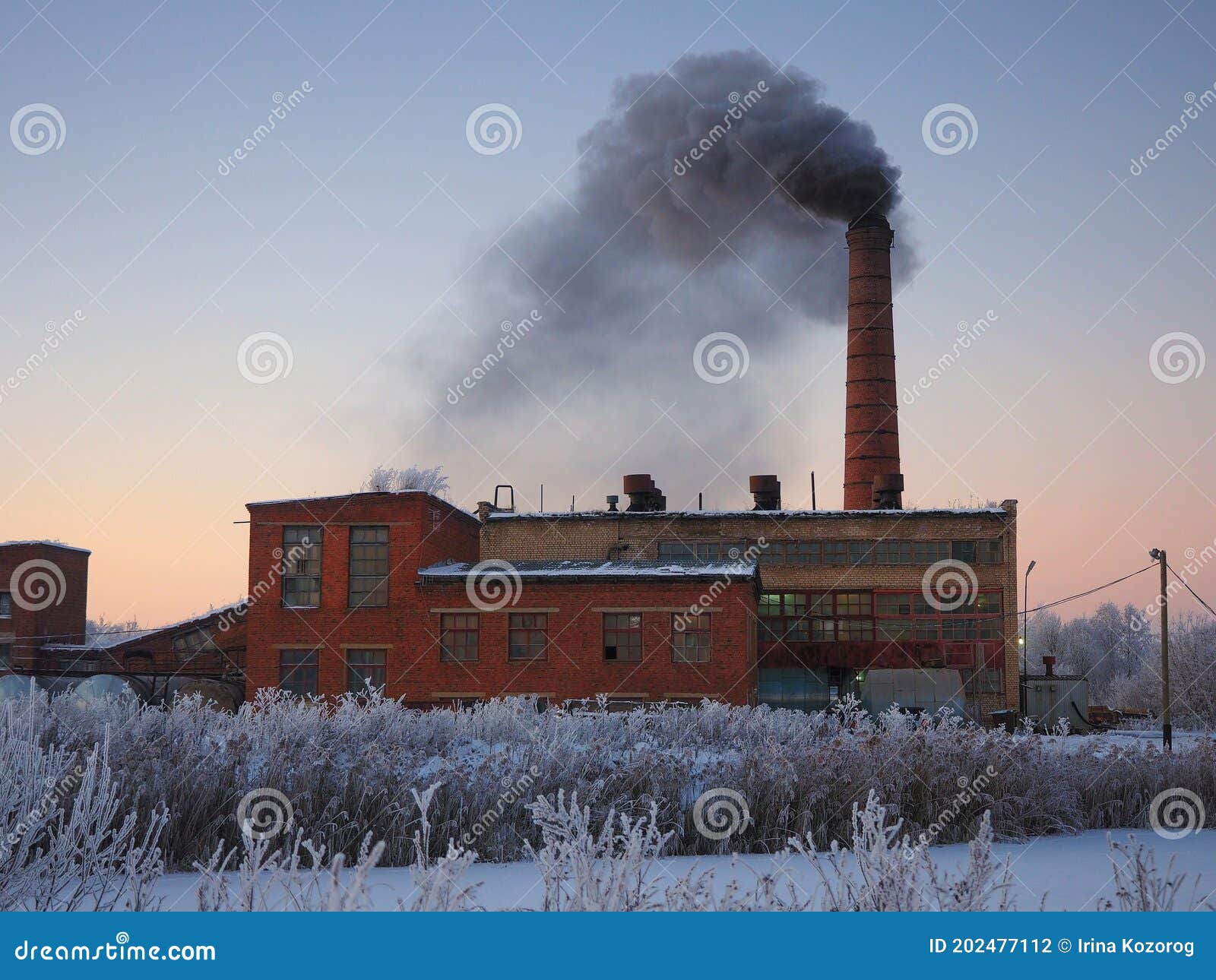 Old Brick Factory Building. Black Smoke from the Pipe Stock Photo ...