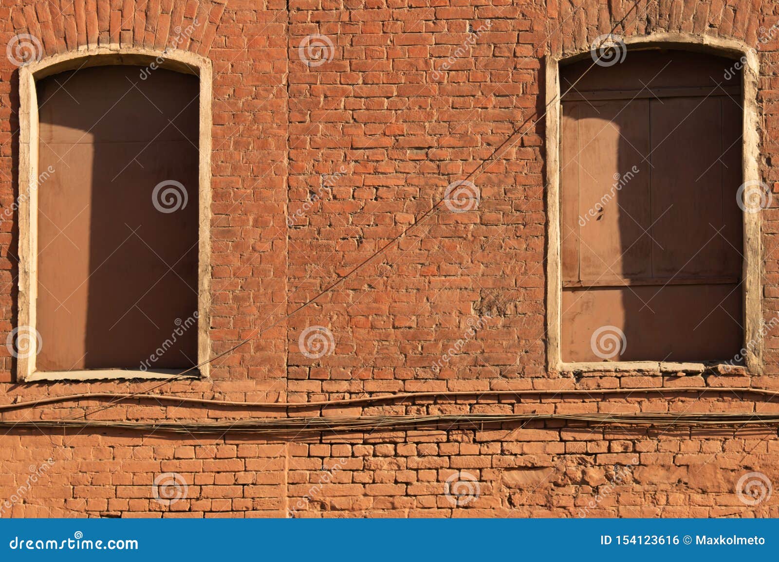 Old Brick Wall with Boarded Windows Background Stock Photo - Image of ...