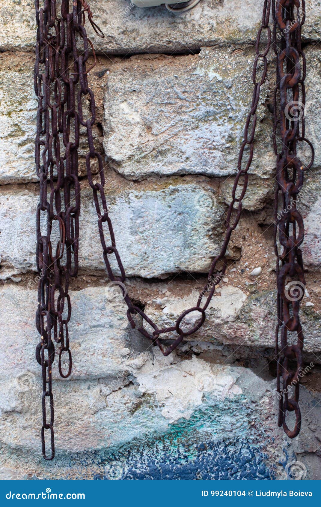 An Old Brick Wall and a Rusty Chain on it for the Background. Stock ...