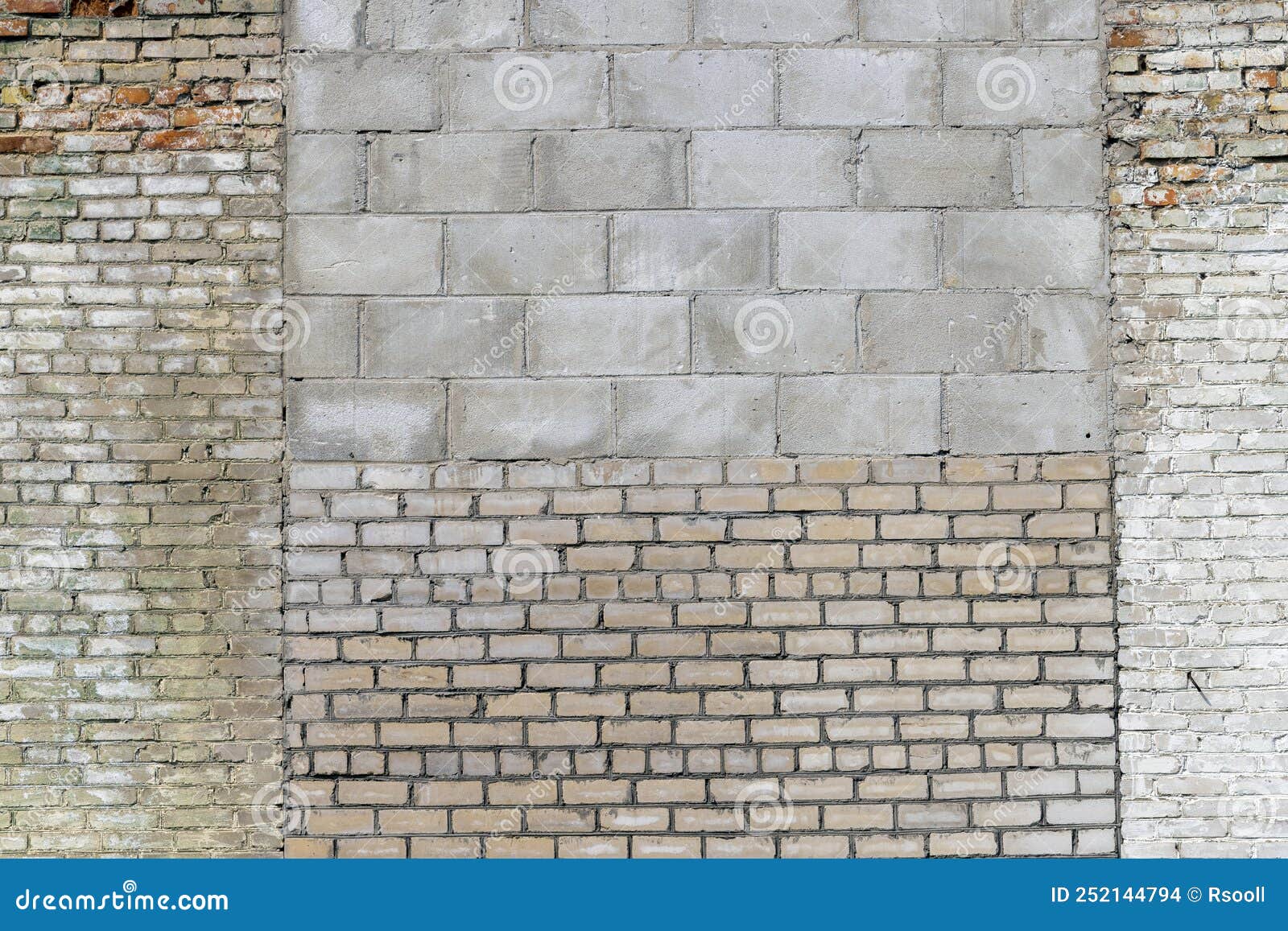 An Old Brick Wall Made of a Large Number of Different Types of Bricks ...
