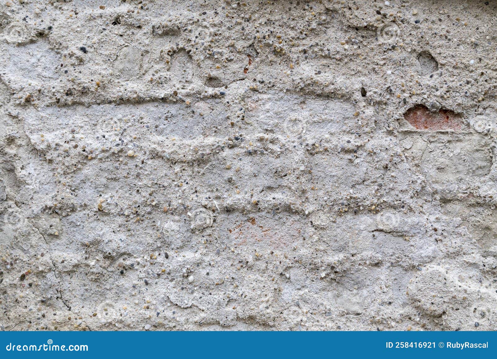 Weathered Pebble Dash Roughly Covering an Old Brick Wall. Abstract ...