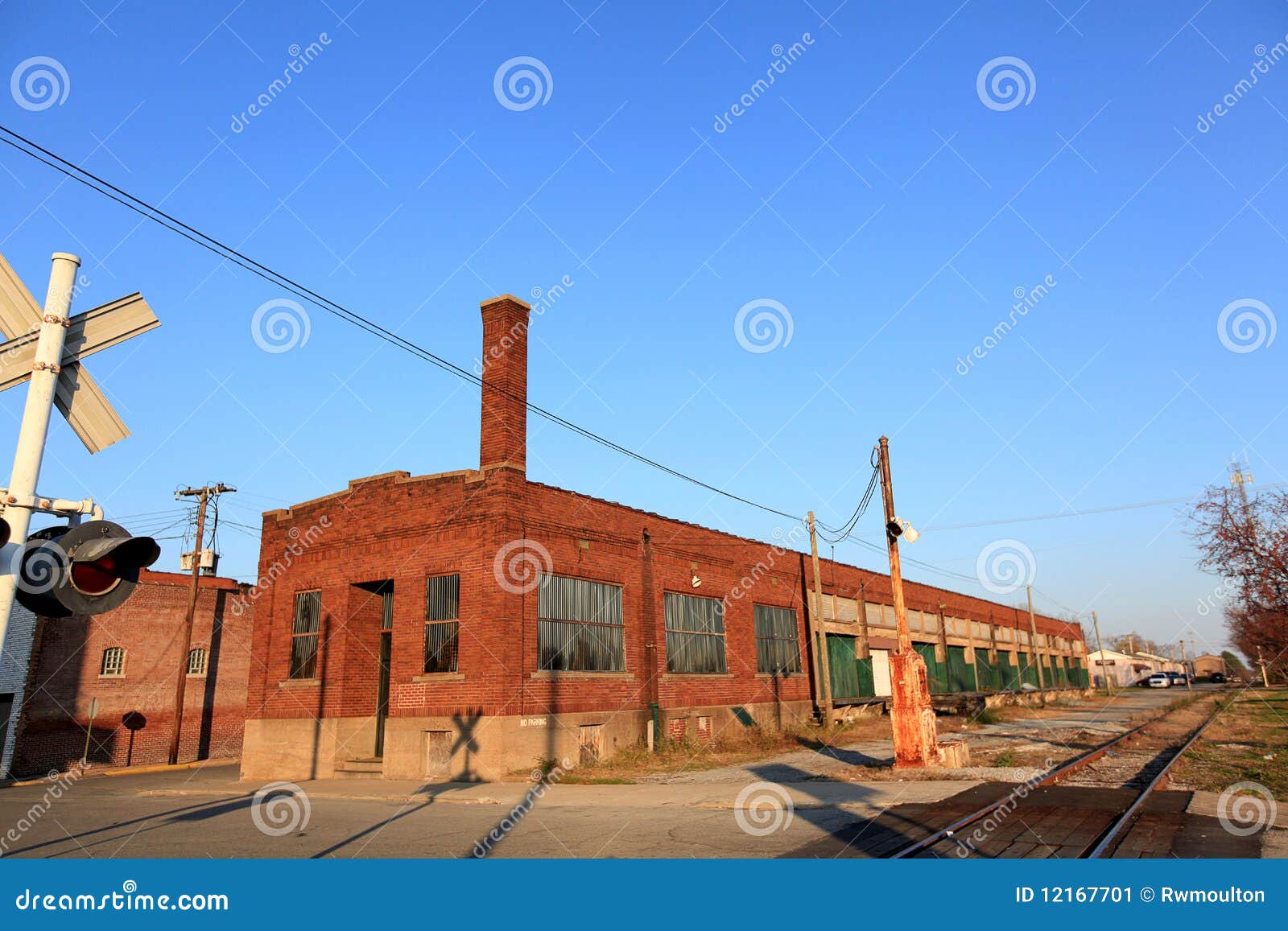 Old Brick Warehouse Along The Tracks Stock Image - Image: 12167701