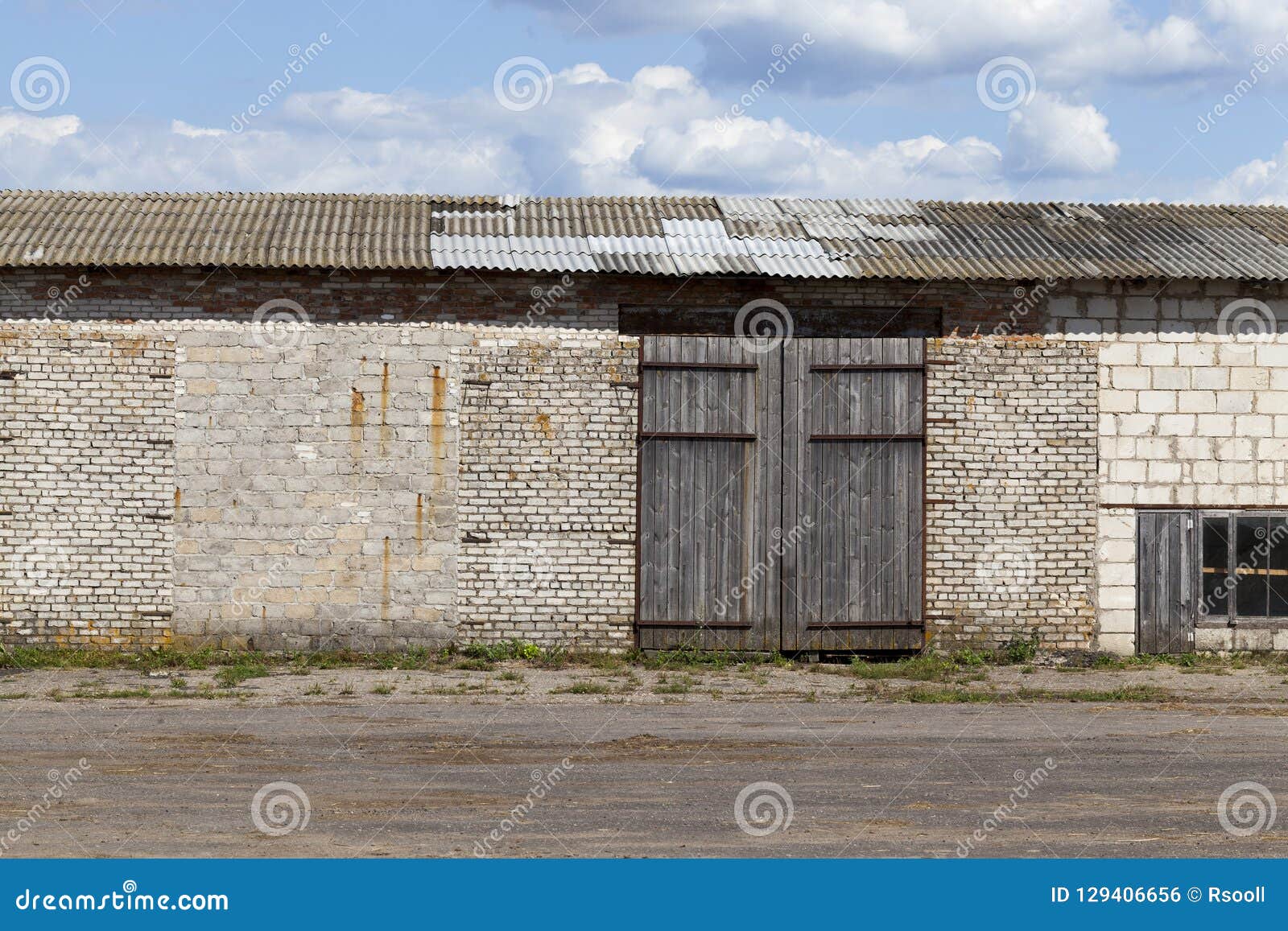 Old brick warehouse stock photo. Image of open, entrance - 129406656