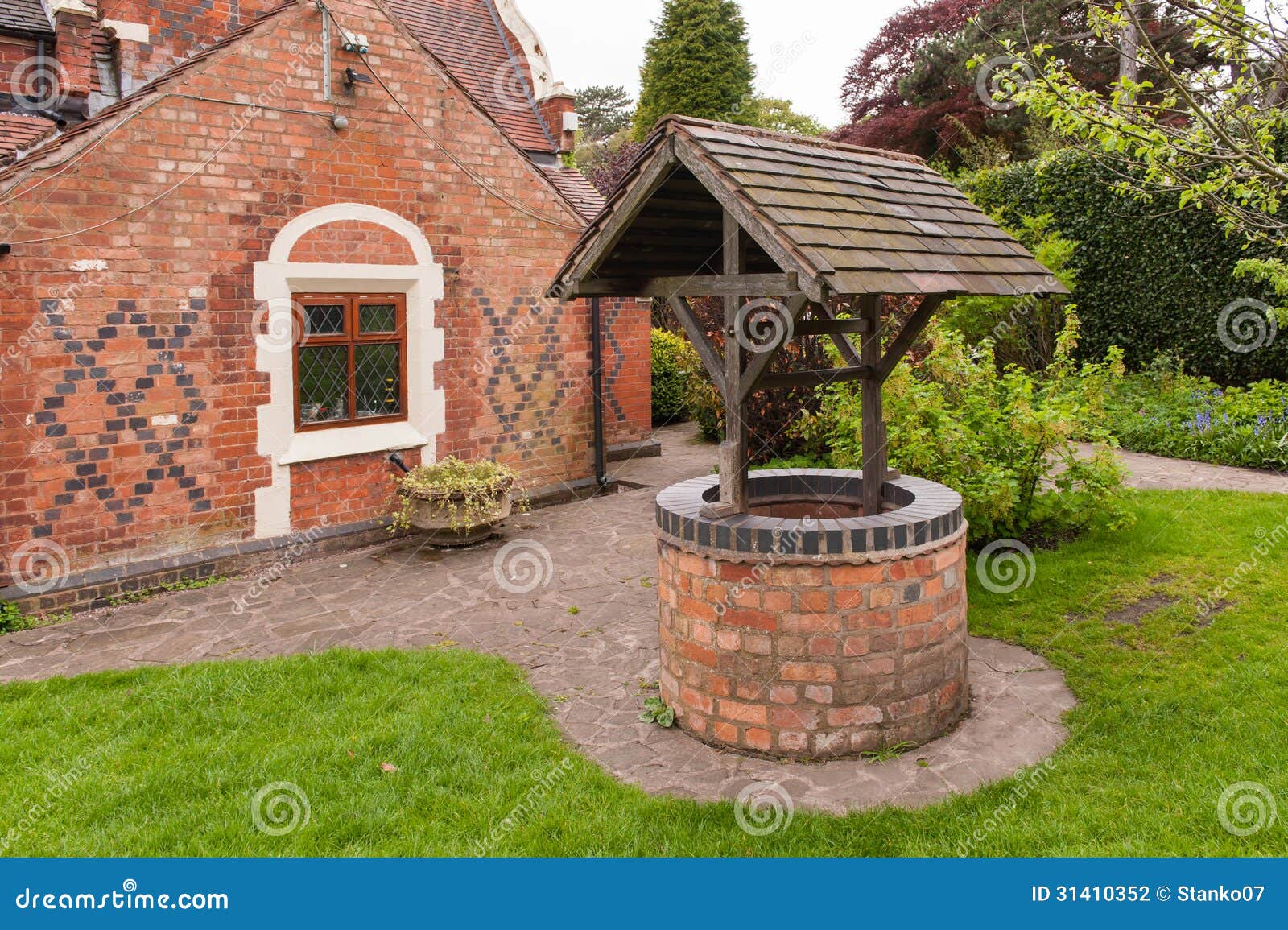 Old bricked well stock photo. Image of courtyard, grass - 31410352