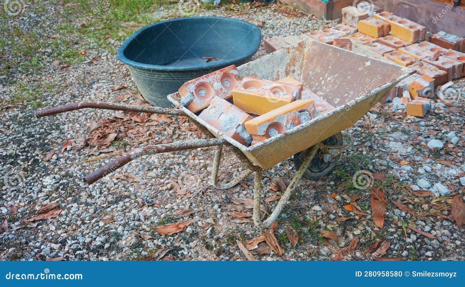 Old Bricks in Wheelbarrow at Construction Site. Stock Photo - Image of ...