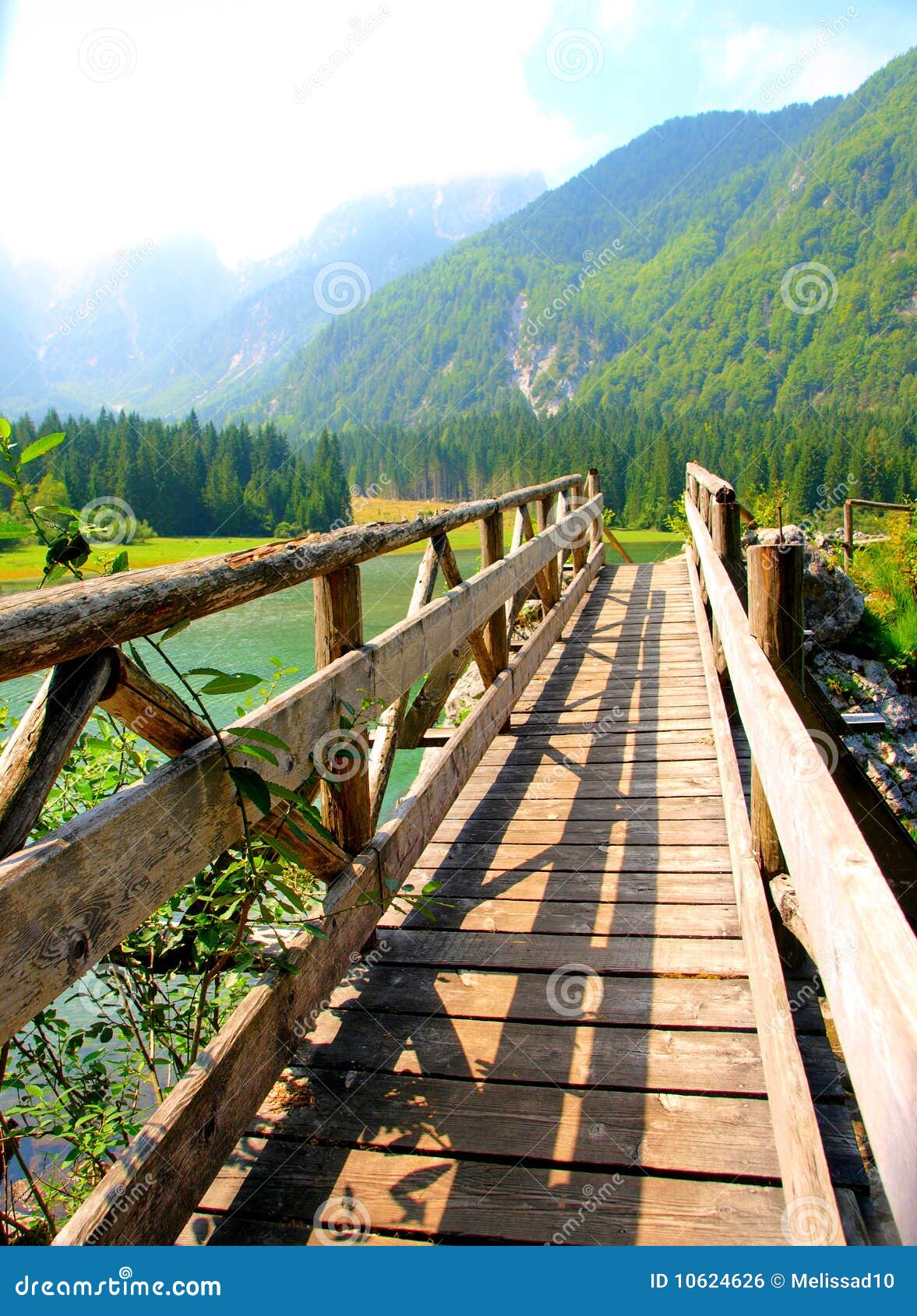 Old bridge on the lake stock photo. Image of stratosphere - 10624626