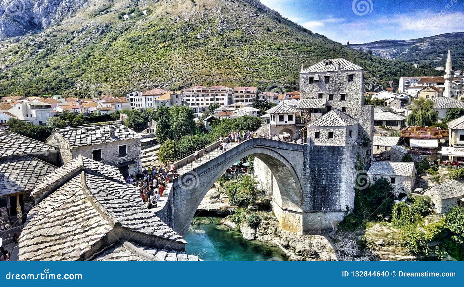 Old Bridge Of Mostar During A Sunny Afternoon. This Bridge, Also Called ...