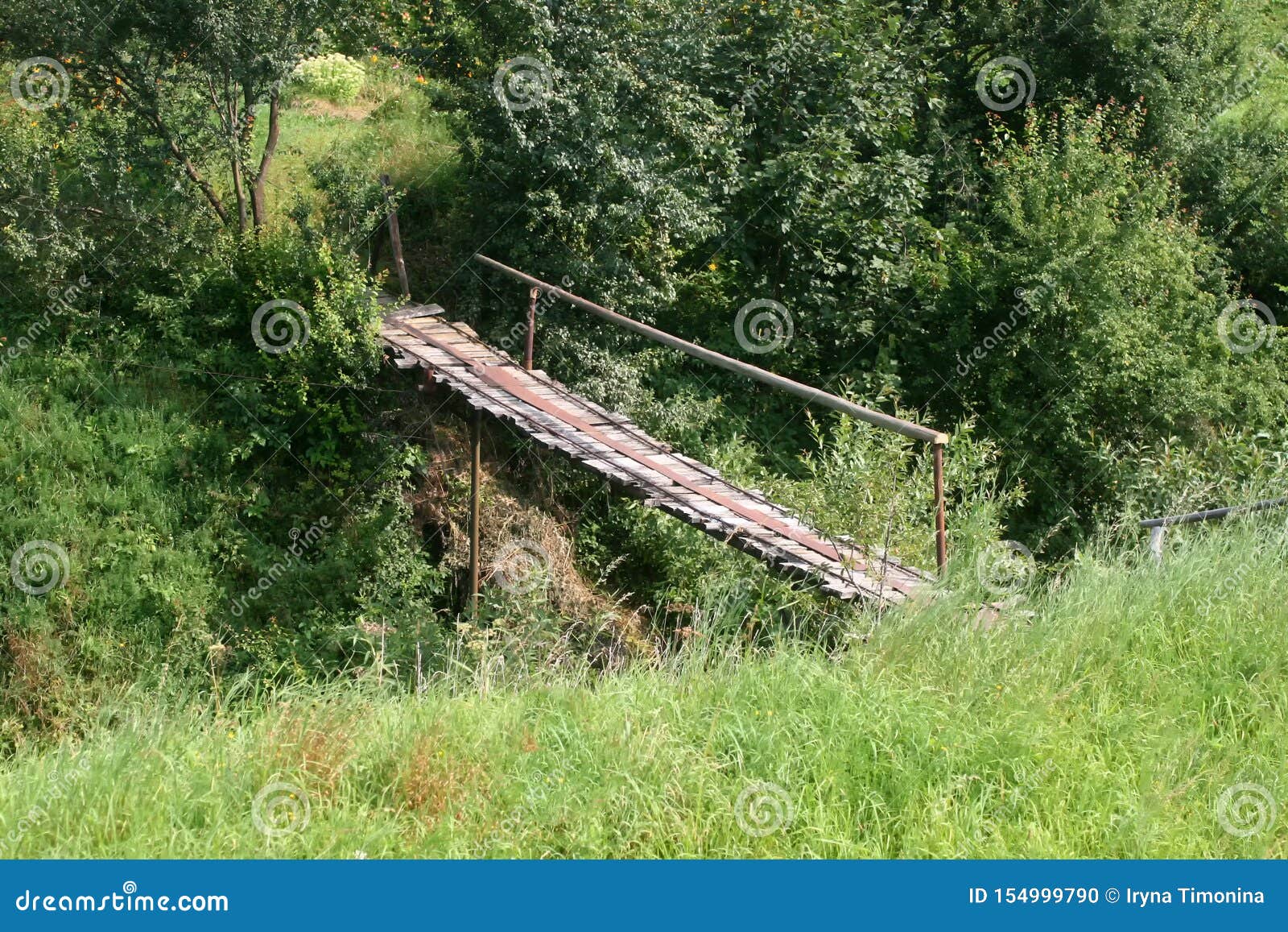 Old Bridge Over the Ravine. Wooden Bridge Over the River. Stock Photo ...