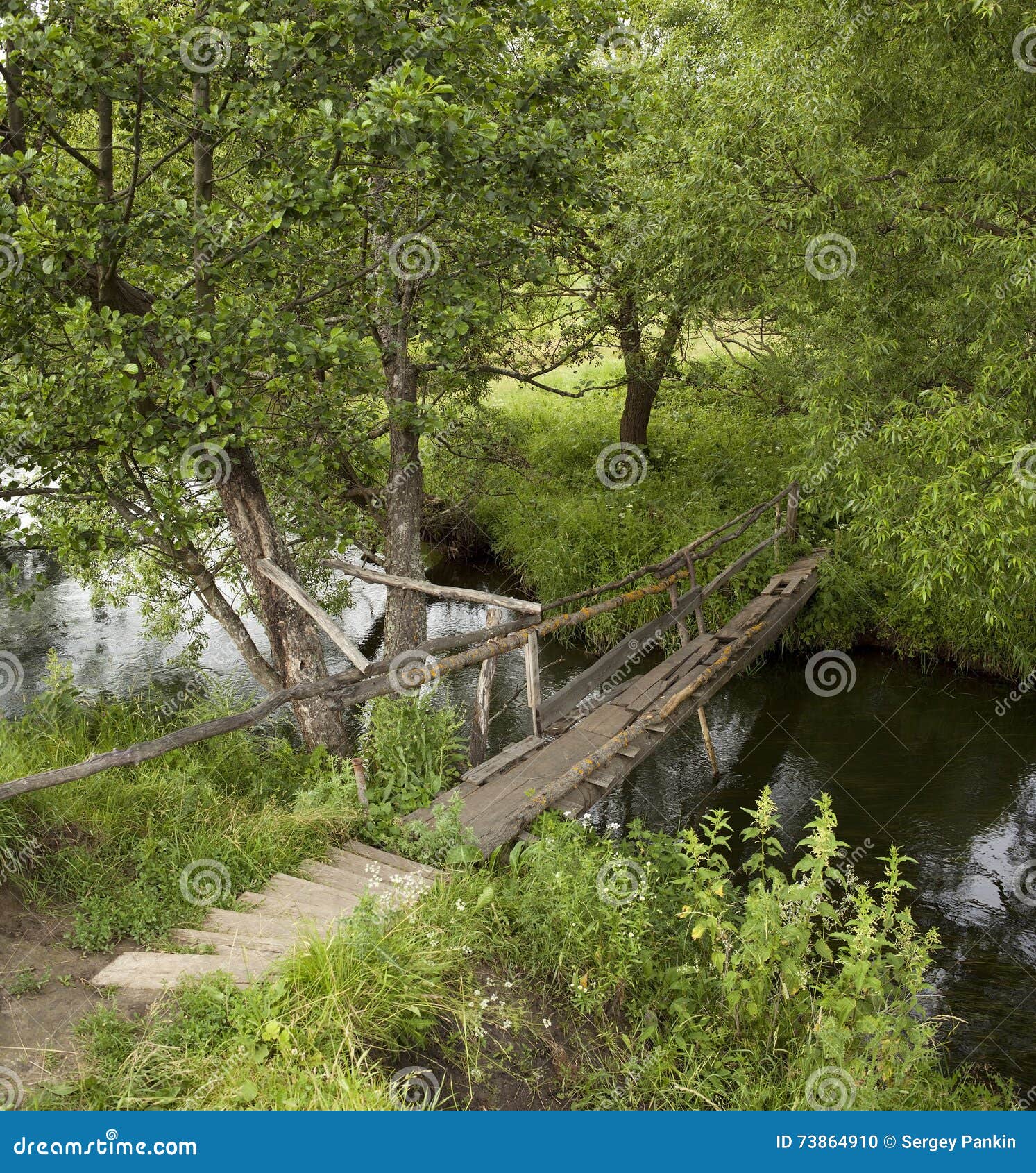 Old bridge over the river. stock photo. Image of river - 73864910