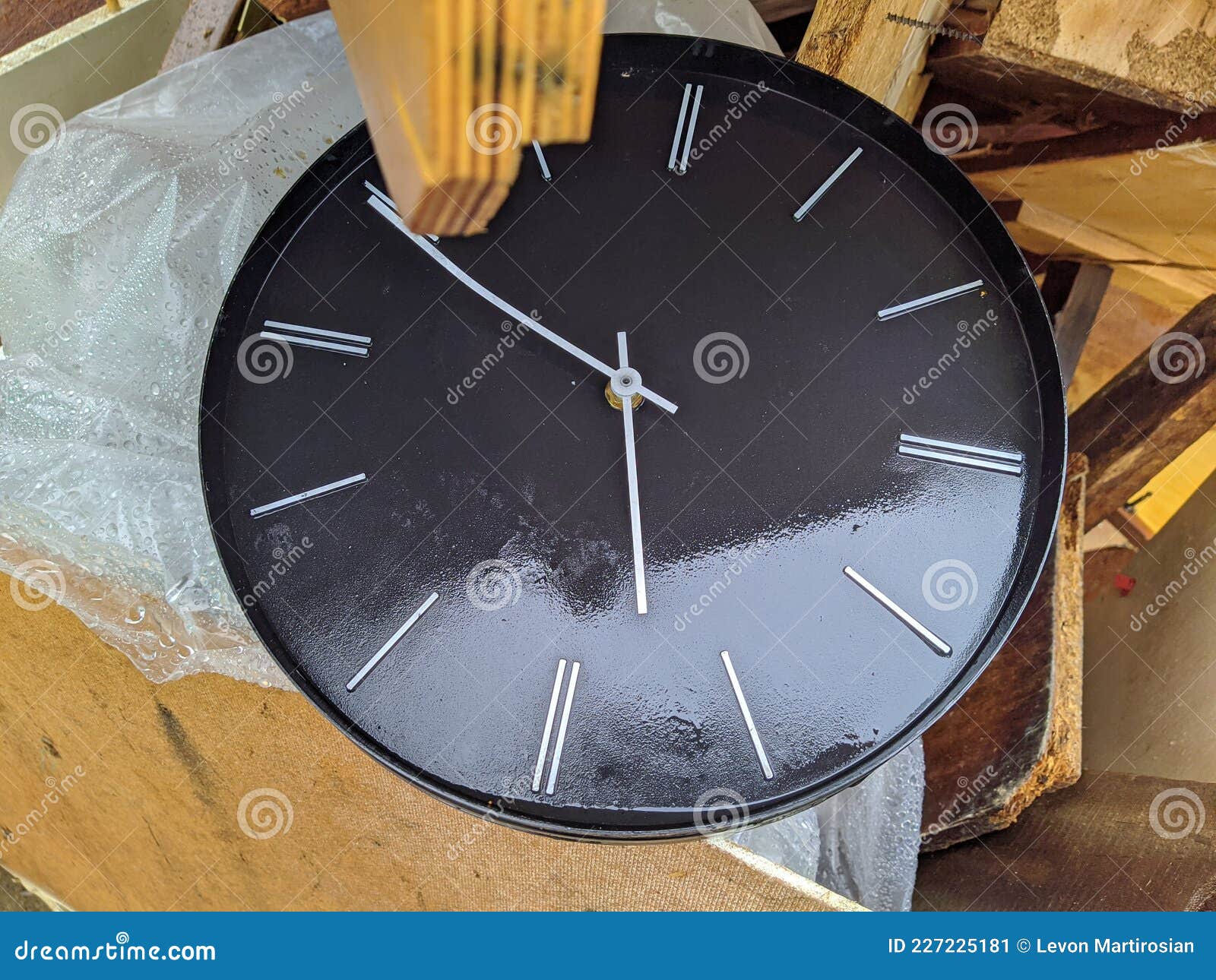 Old and Broken Black Clock in a Garbage Dump in a Rainy Time. Stock ...