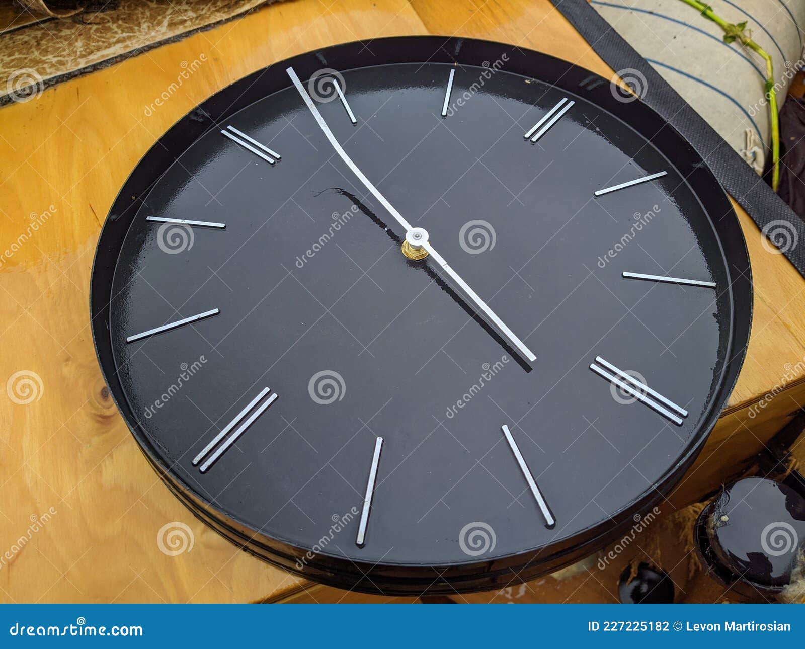 Old and Broken Black Clock in a Garbage Dump in a Rainy Time. Stock ...