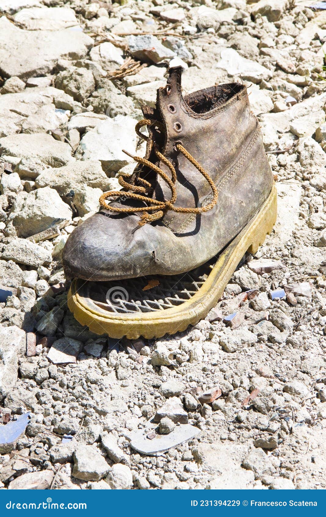 Old Broken Boot Abandoned in a Rubble Background Stock Image - Image of ...