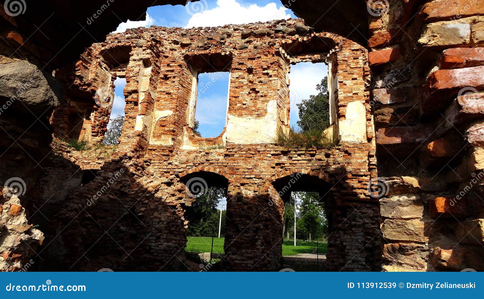 An Old Broken Brick Wall with Cracks. Ruined Wall of the Old Cathedral ...