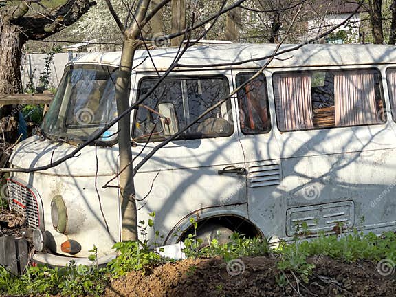 Old Broken Bus at a Car Dump Stock Image - Image of broken, obsolete ...