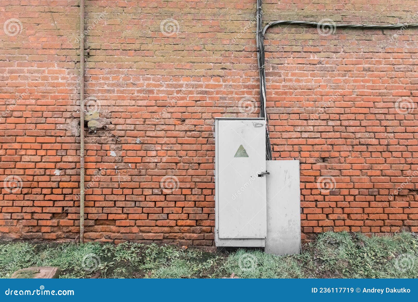 The Old Broken Electrical Panel or Box on the Wall. Industrial ...