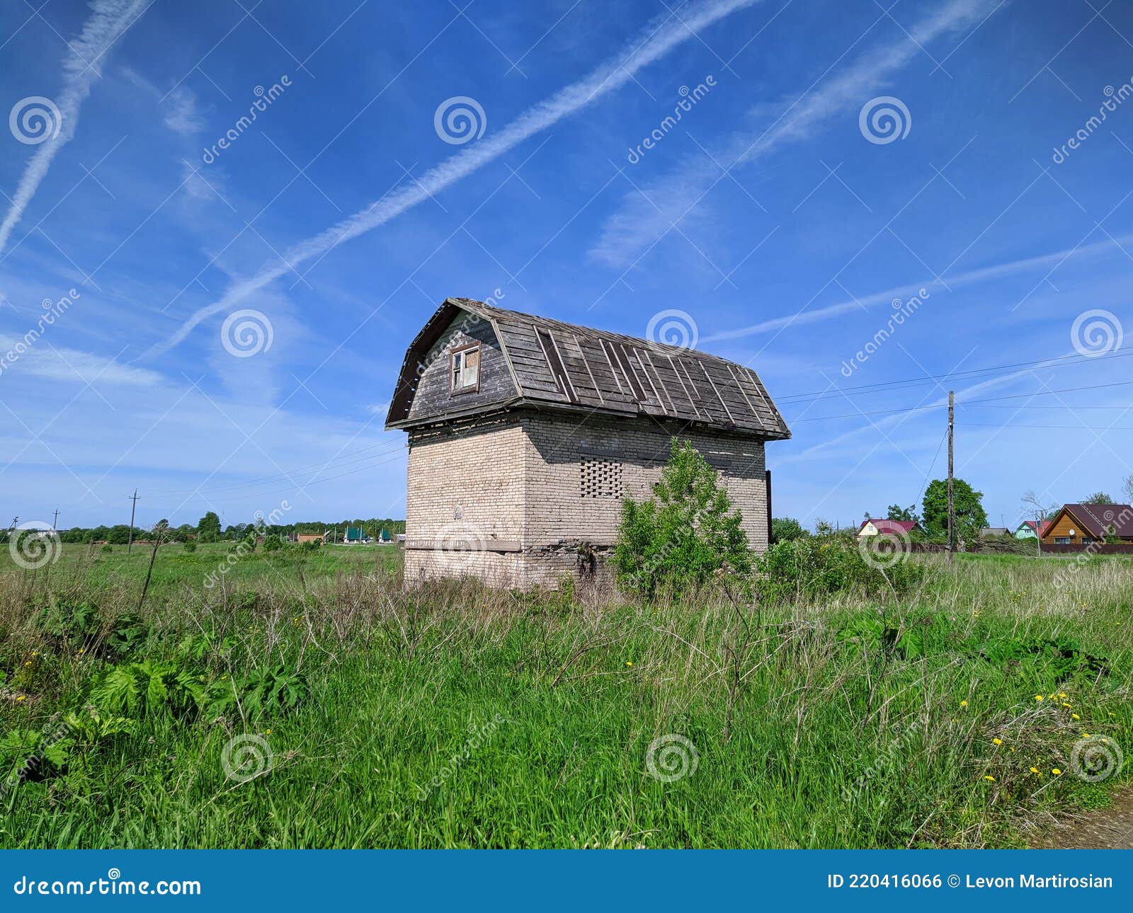 Old and Broken House Made of White Bricks on a Blue Sky Background ...