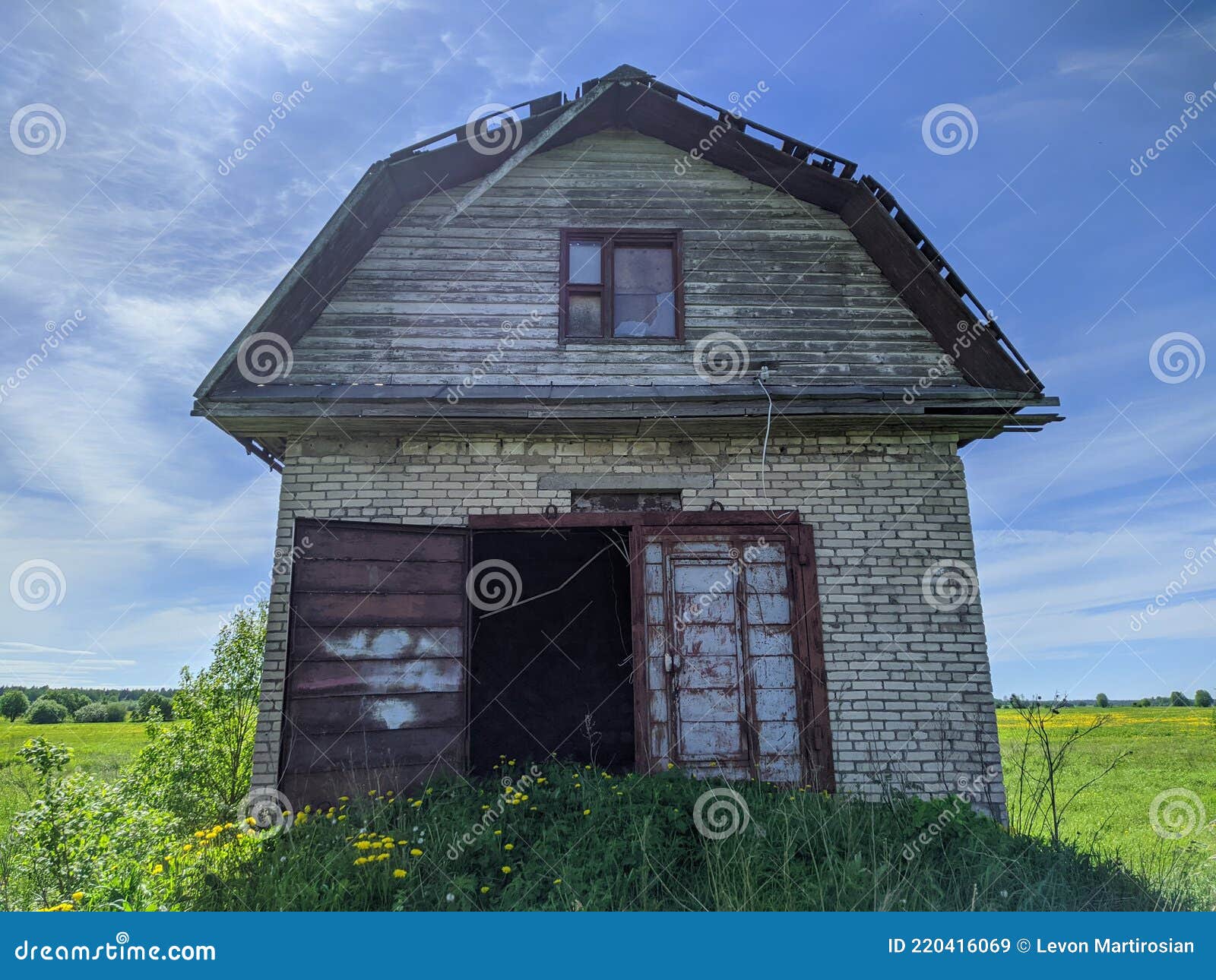 Old and Broken House Made of White Bricks on a Blue Sky Background ...