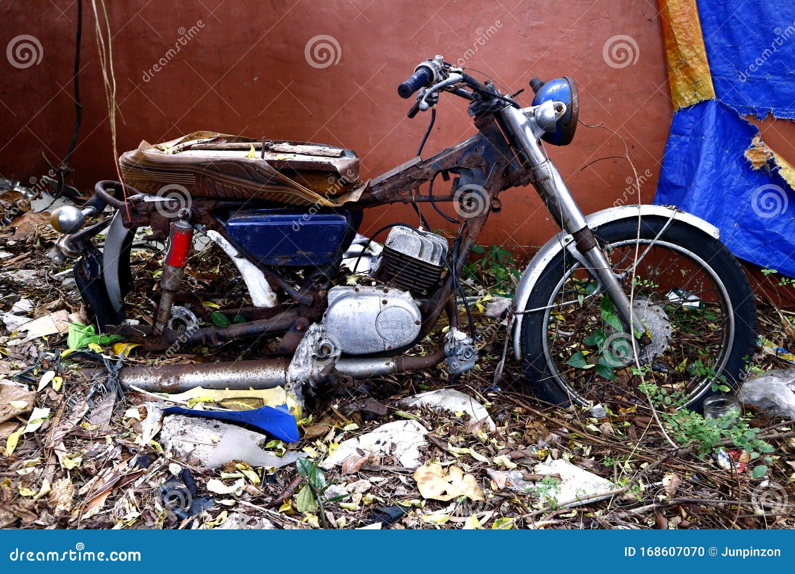 Old, Broken and Rusty Motorcycle at an Empty Lot Stock Photo - Image of ...