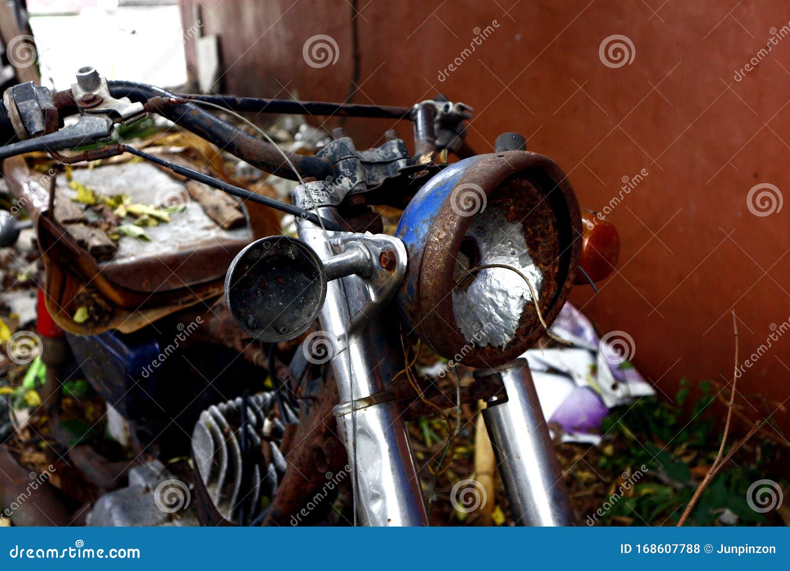 Old, Broken and Rusty Motorcycle at an Empty Lot Stock Photo - Image of ...