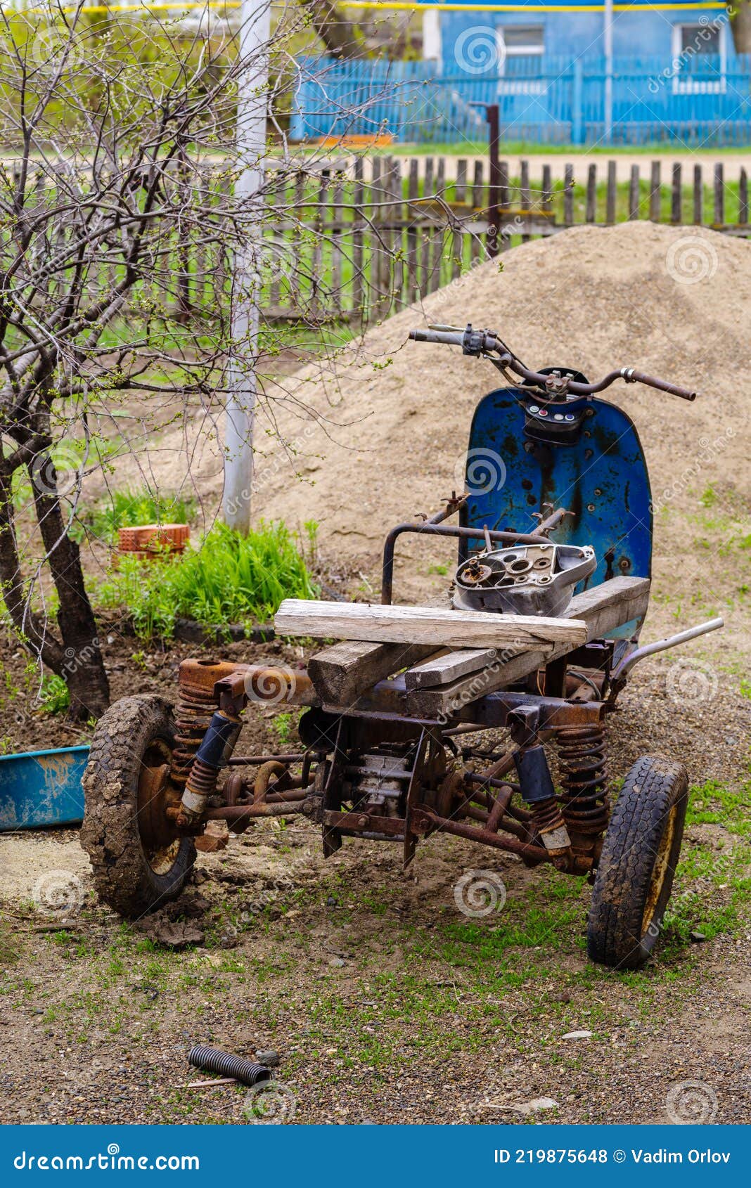 Old Broken Three-wheeled Scooter Stock Photo - Image of fence, broken ...