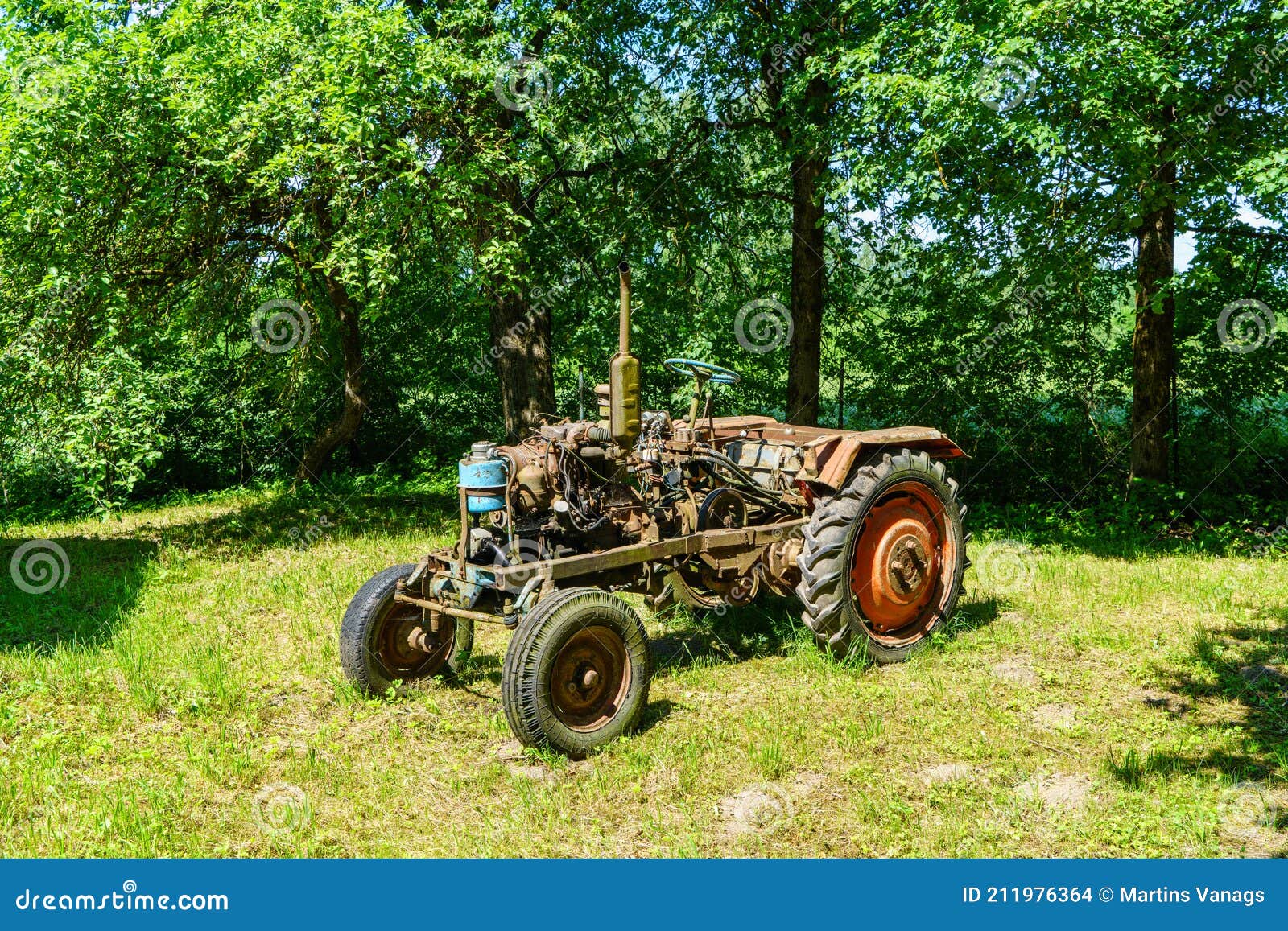 Old Broken Tractor in the Field Stock Photo - Image of parts, tree ...