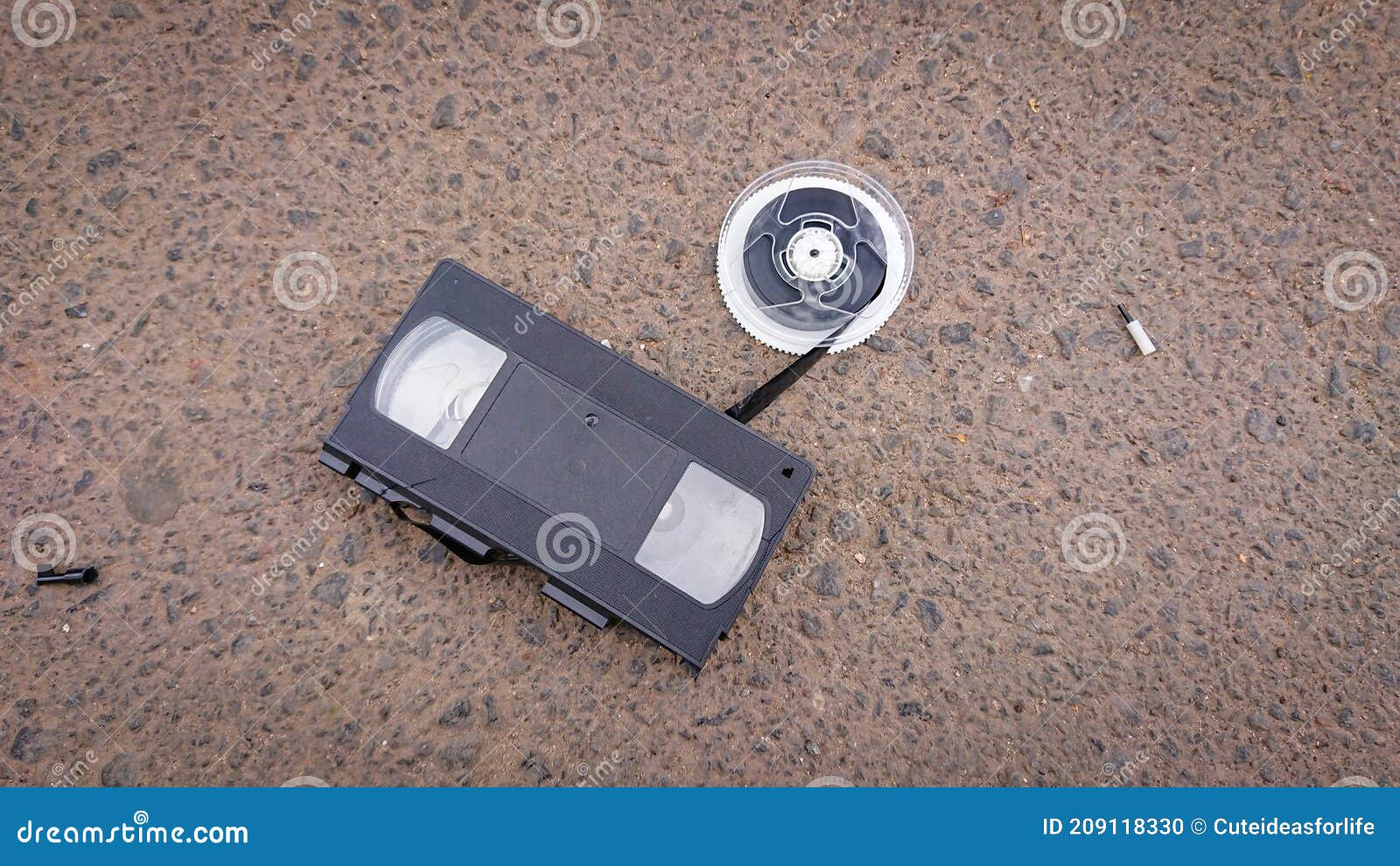 An Old Broken VHS Videotape Lies on Asphalt Stock Photo - Image of sand ...