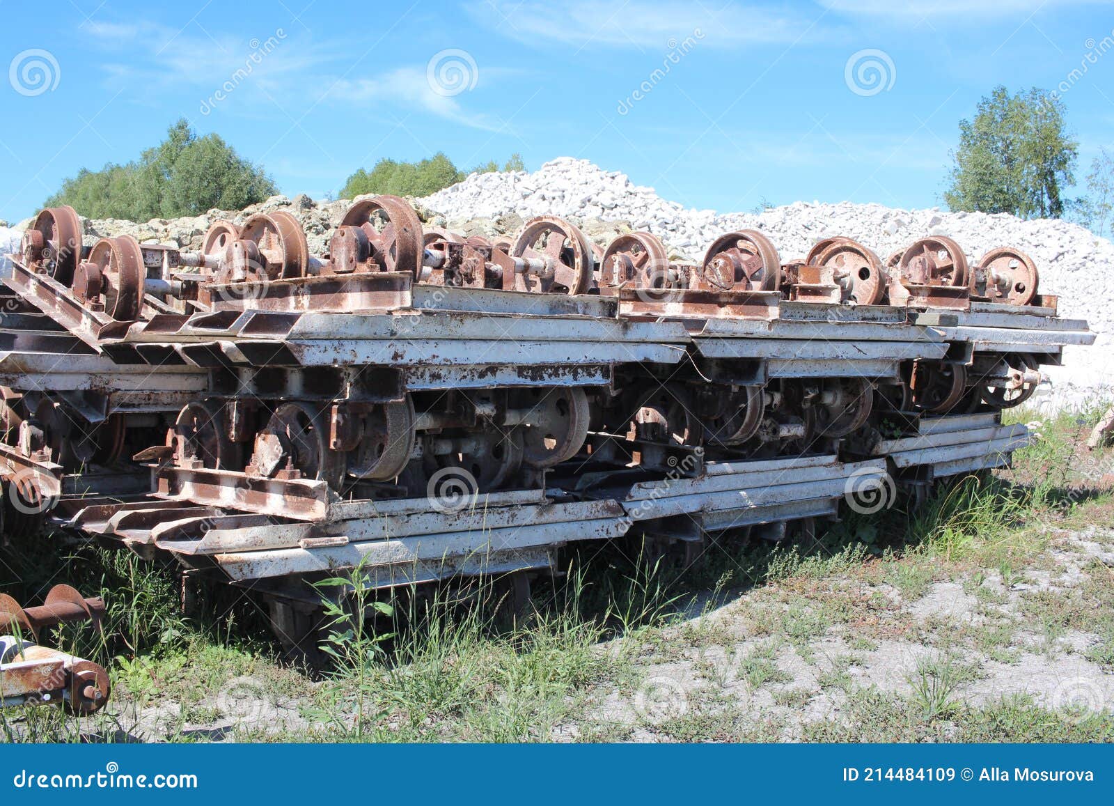 Old Broken Wheels of a Metal Trolley in a Junkyard Wagons Stock Image ...