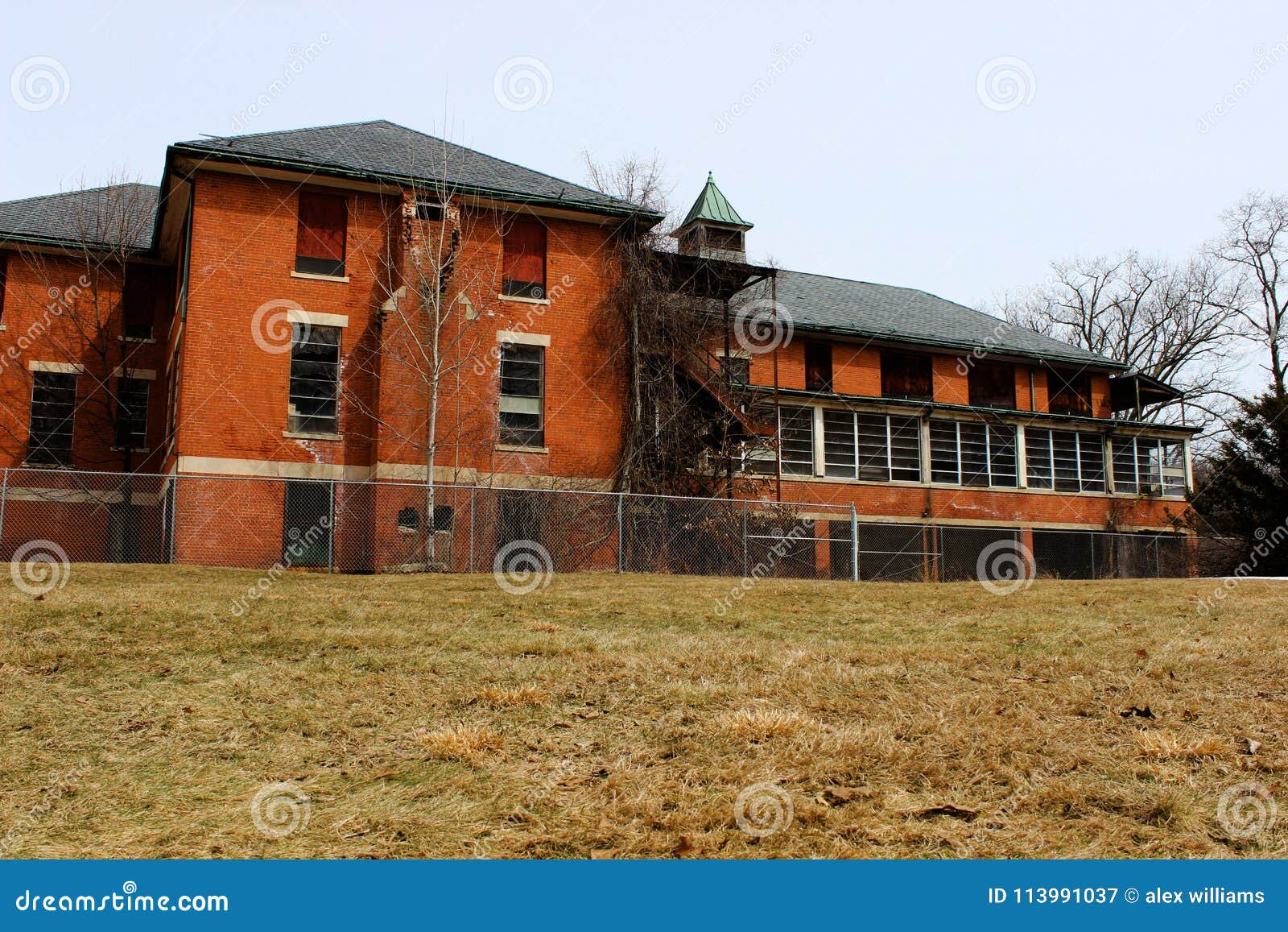 Old Broken Windows on Abandoned Brick Asylum Building Stock Image ...