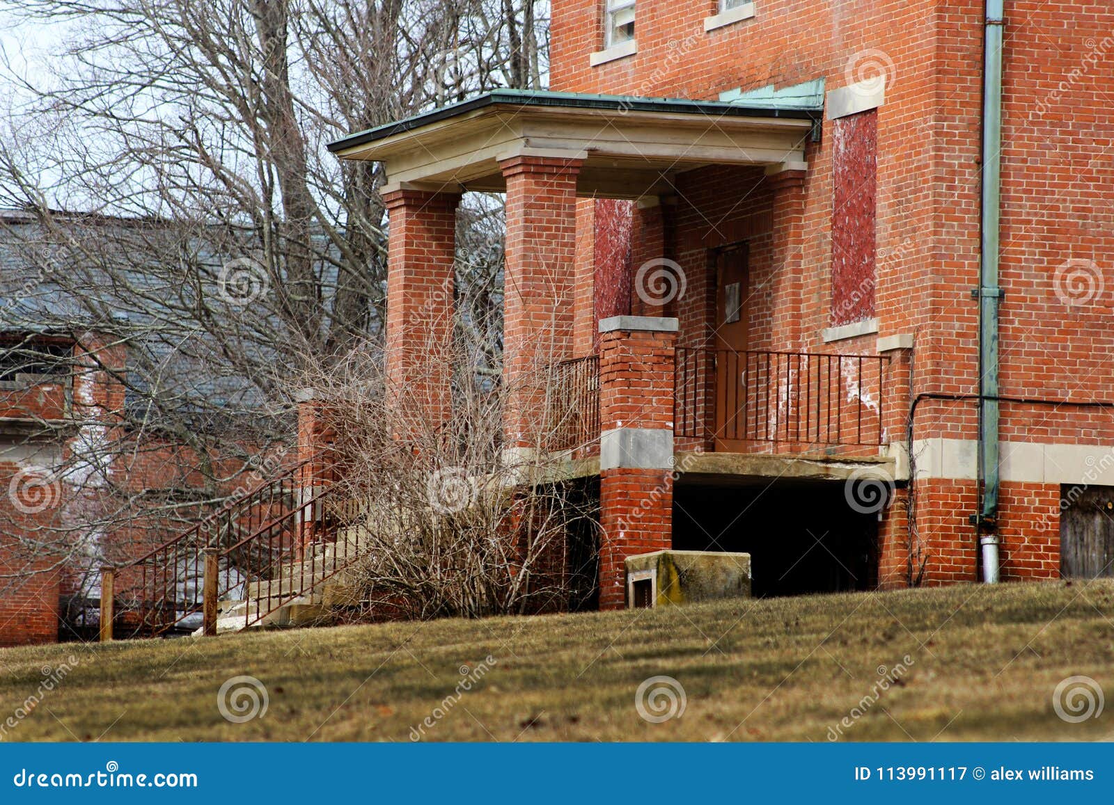 Old Broken Windows on Abandoned Brick Asylum Building Stock Image ...