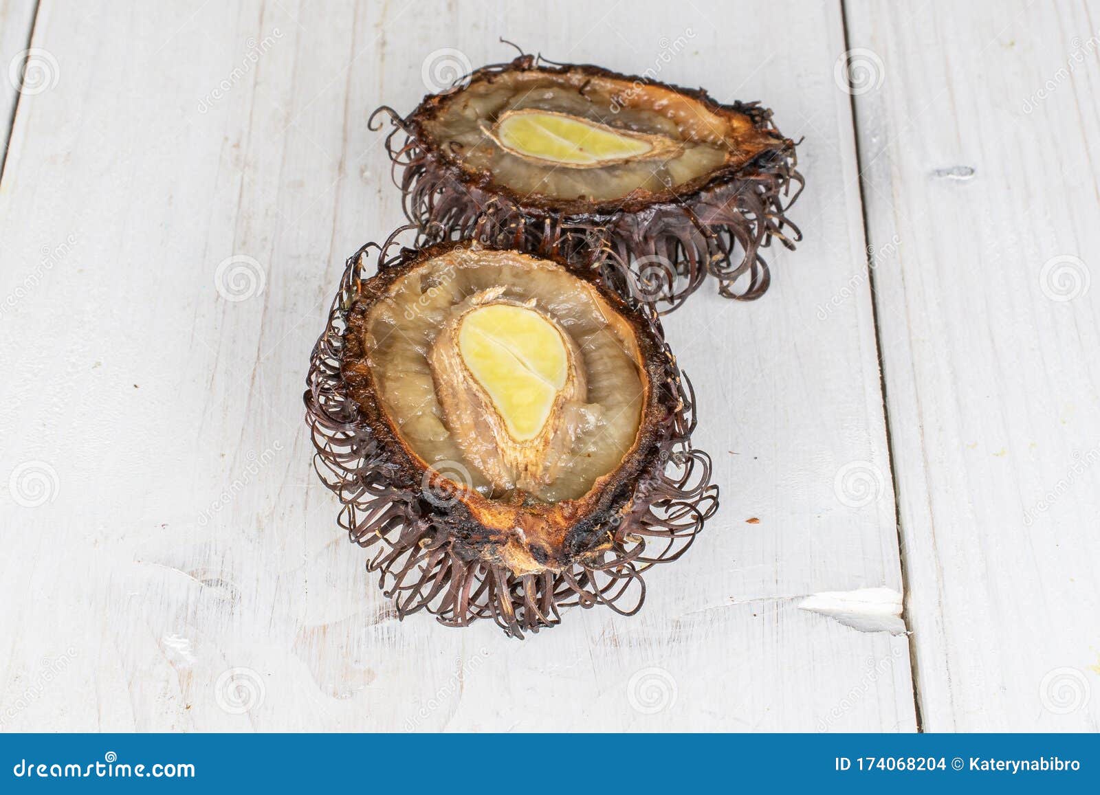 Old Brown Rambutan on Grey Wood Stock Photo - Image of sliced, acidic ...